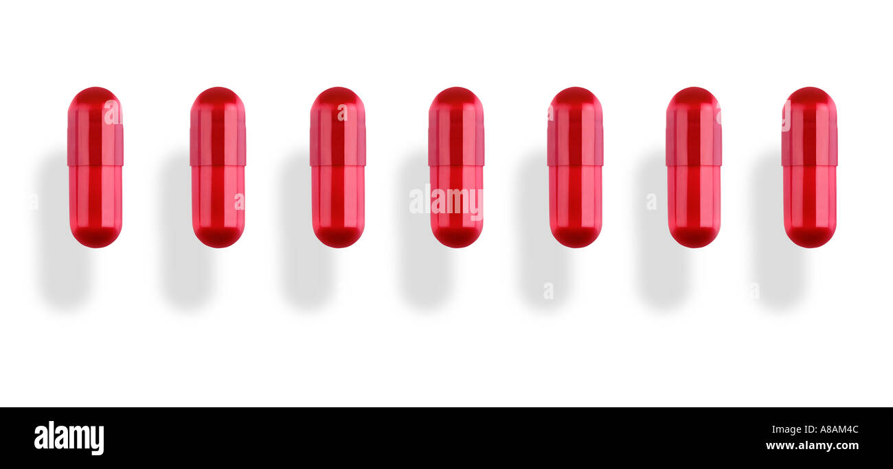 tablets caps in a row Tabletten Kapseln in einer Reihe Stock Photo - Alamy