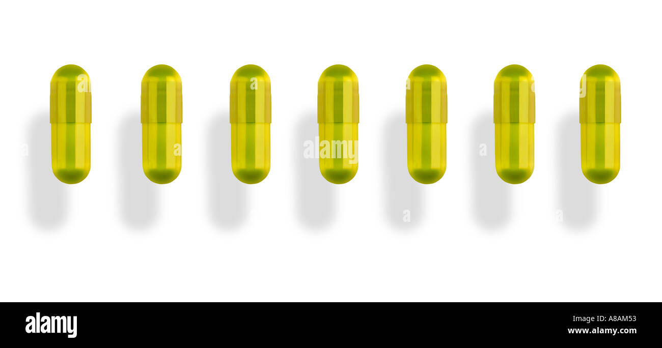 tablets caps in a row Tabletten Kapseln in einer Reihe Stock Photo - Alamy