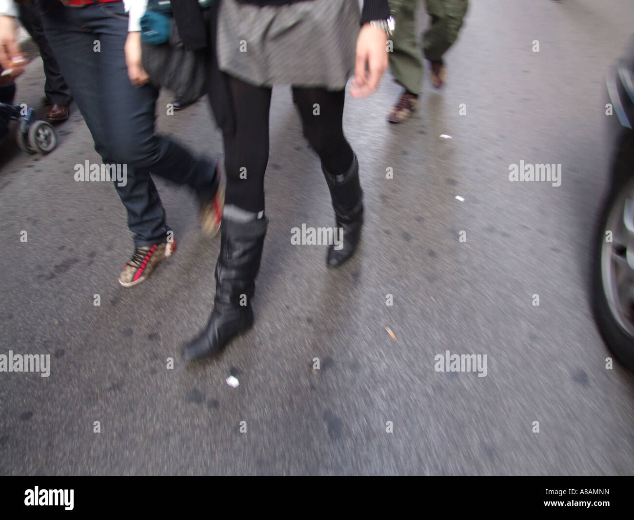 one person walking in street in city town Stock Photo - Alamy