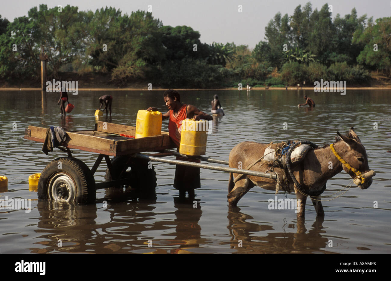 people collecting water from the Baro river, Gambella, Ethiopia Stock ...