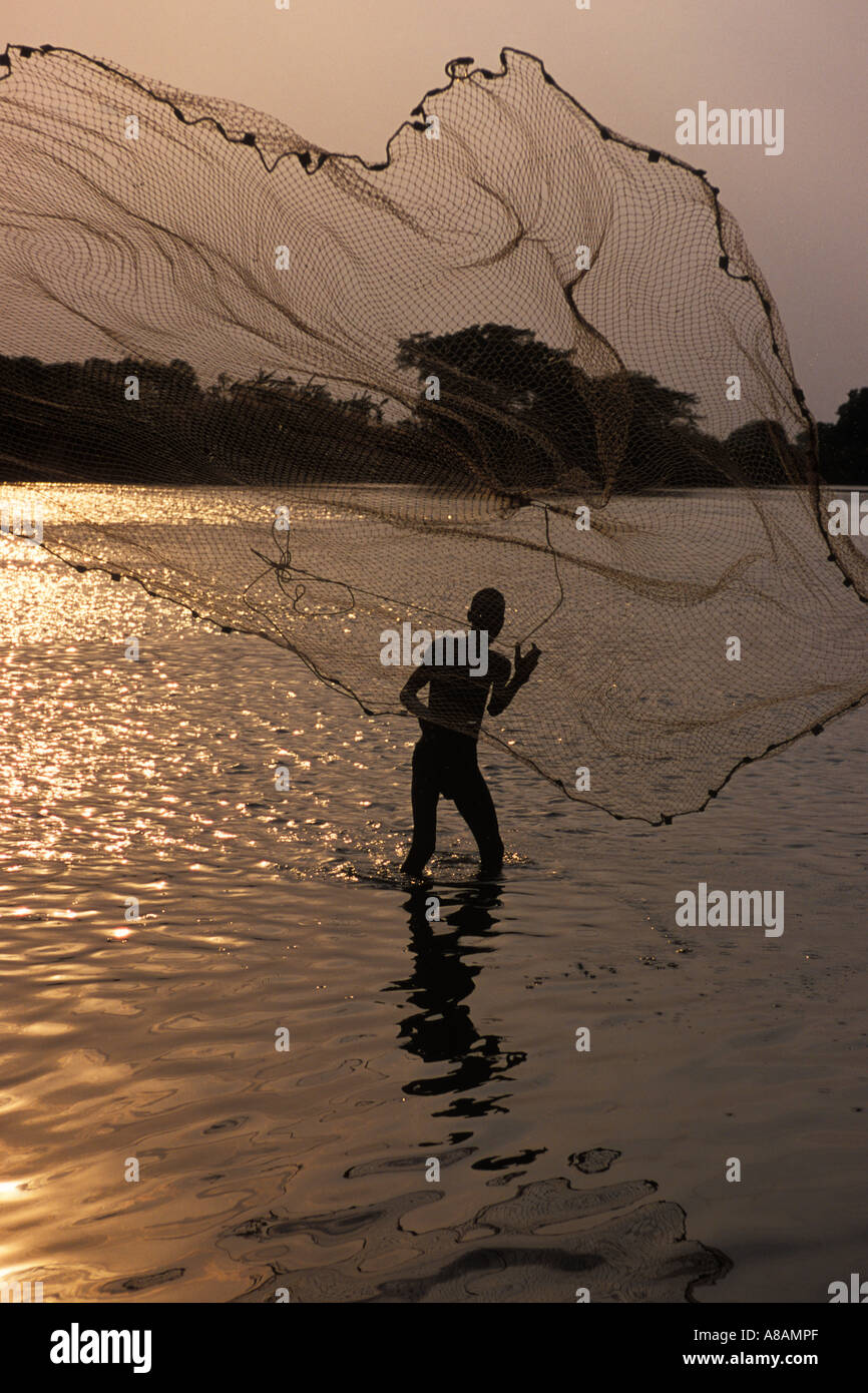 traditional fishing with net in the Baro river, Gambella, Ethiopia ...