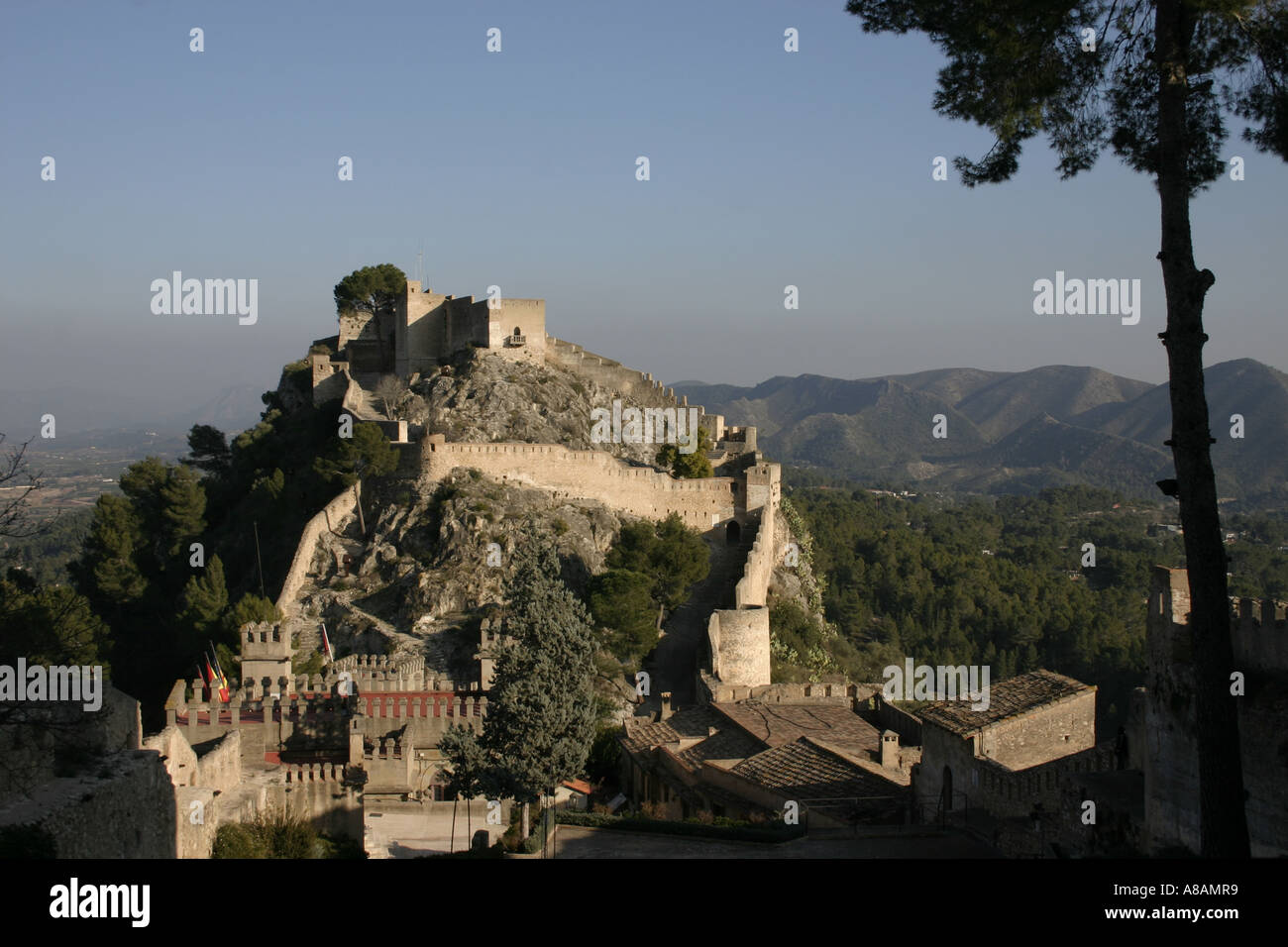 Xativa castle in Spain at dusk Stock Photo - Alamy