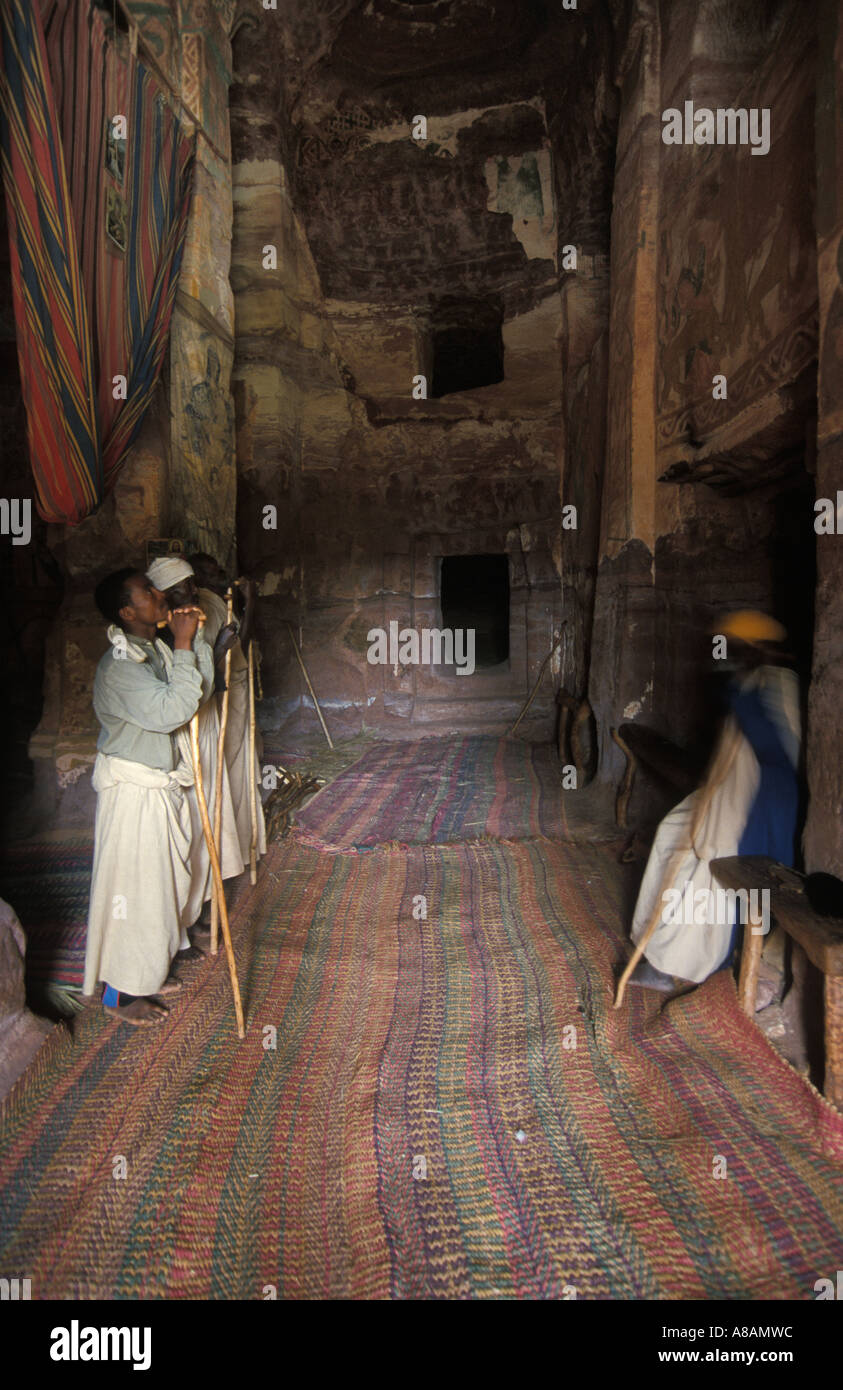 people praying , Debre Tsion rock-hewn church , Gheralta , Eastern ...