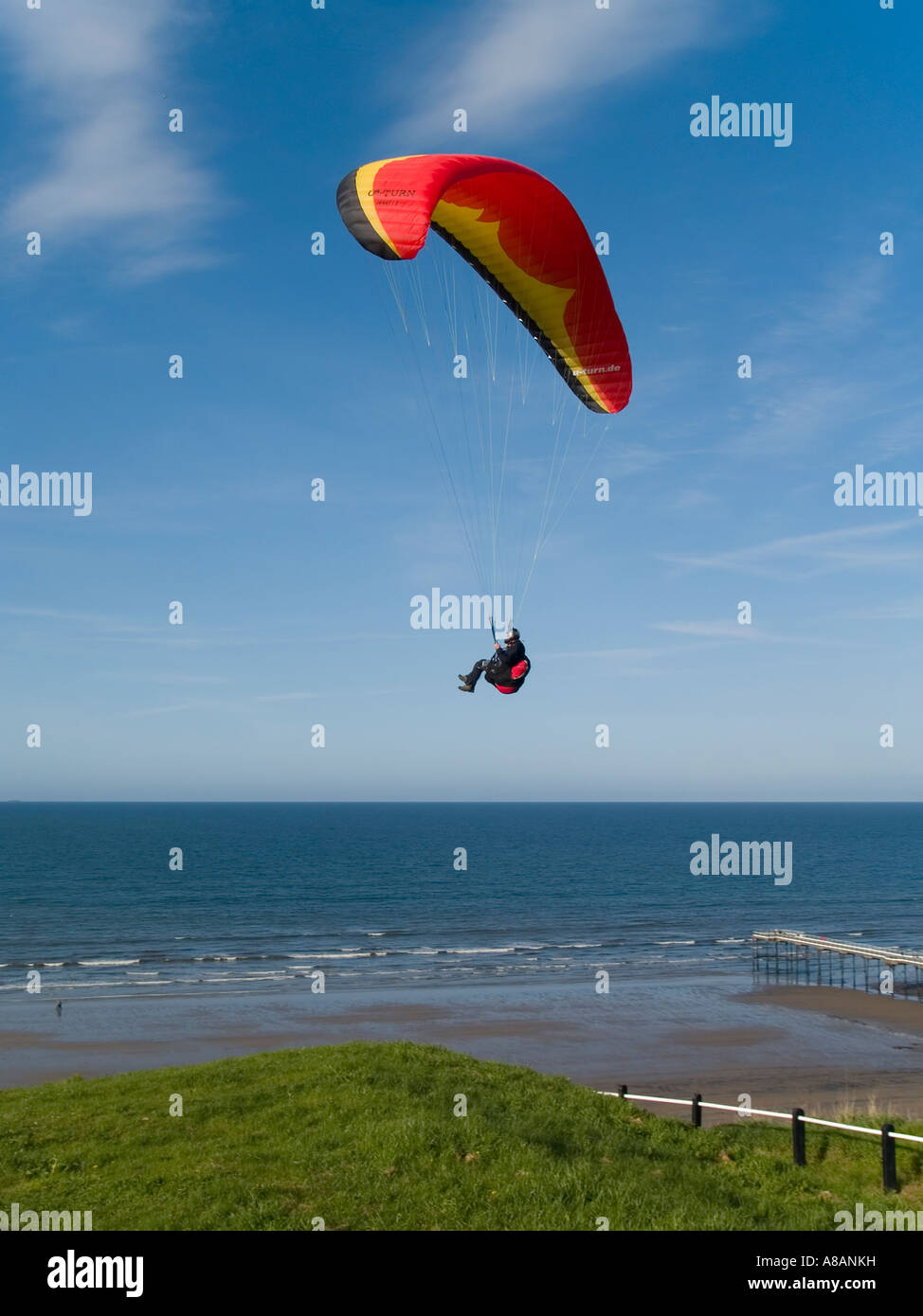 Paraglider flying over the cliffs at Saltburn Cleveland Stock Photo - Alamy