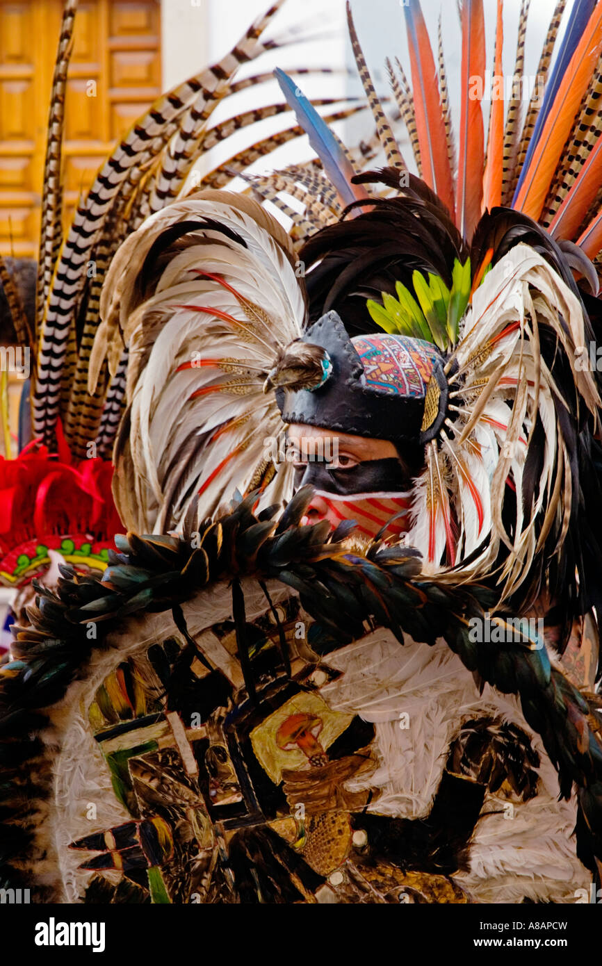 An AZTEC DANCER performs in a traditional warrior feathered COSTUME ...