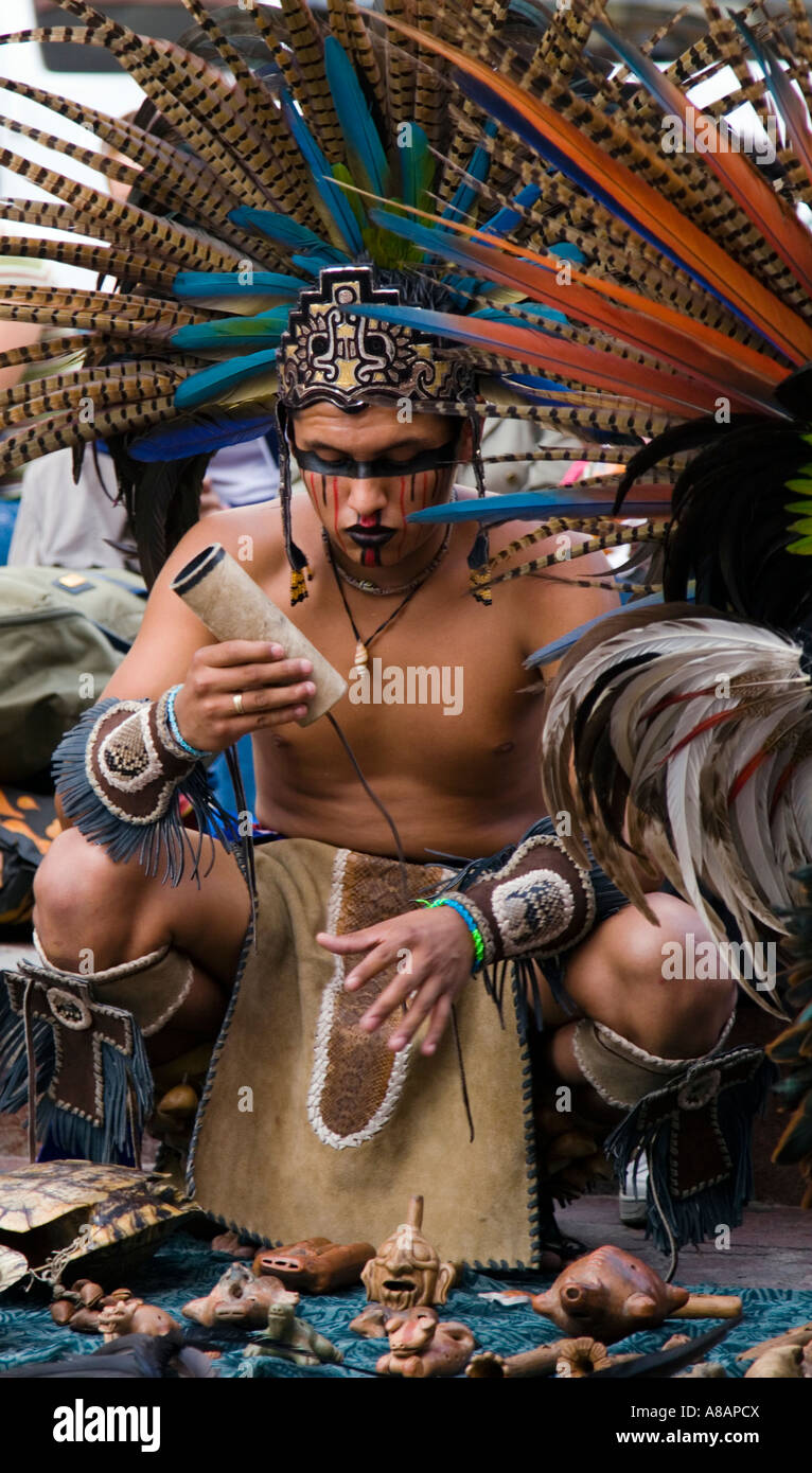 An AZTEC DANCER performs in a traditional warrior feathered COSTUME ...