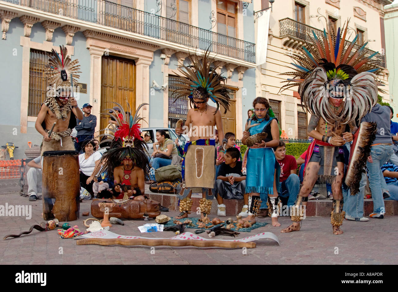 An AZTEC DANCE TROUPE performs in traditional warrior feathered ...