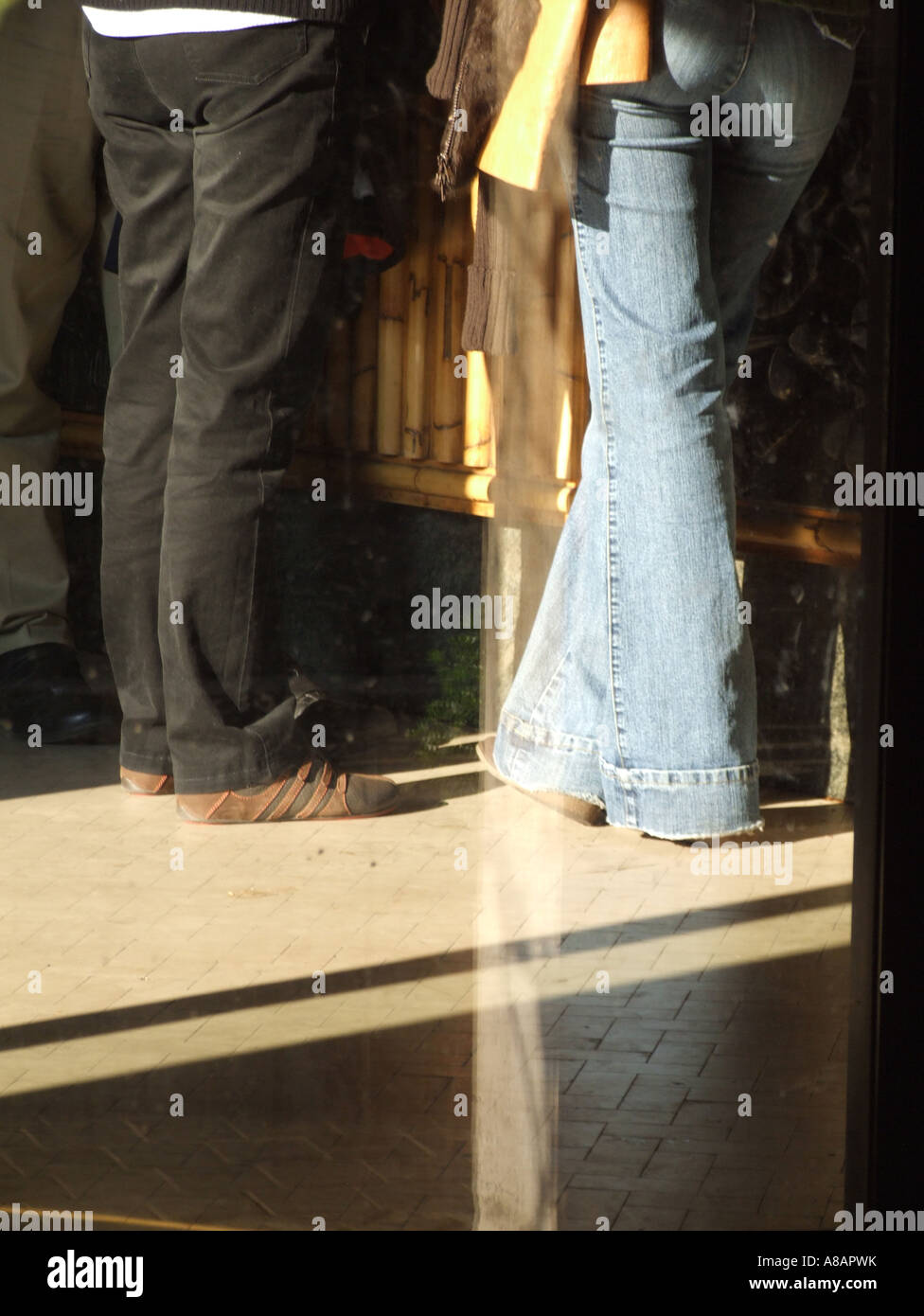 people standing in bar Stock Photo - Alamy