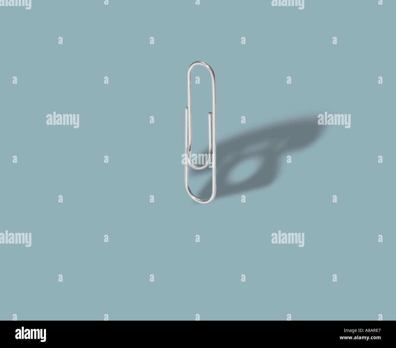 Phone symbol and paperclip Stock Photo - Alamy