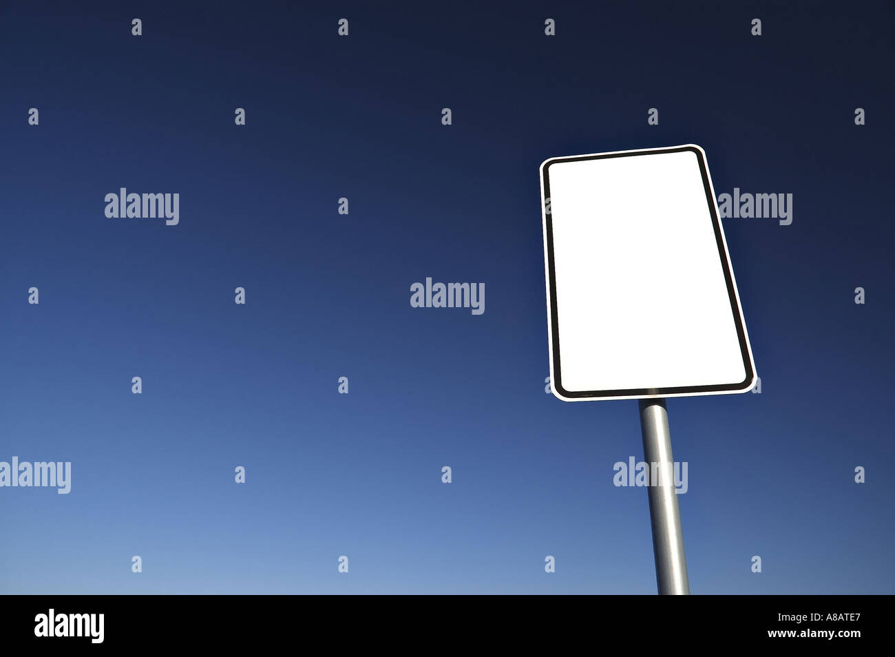 Plain white signboard against blue sky Stock Photo - Alamy