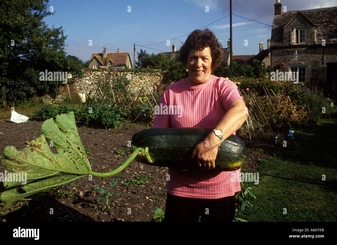 Giant vegetable and woman hi-res stock photography and images - Alamy