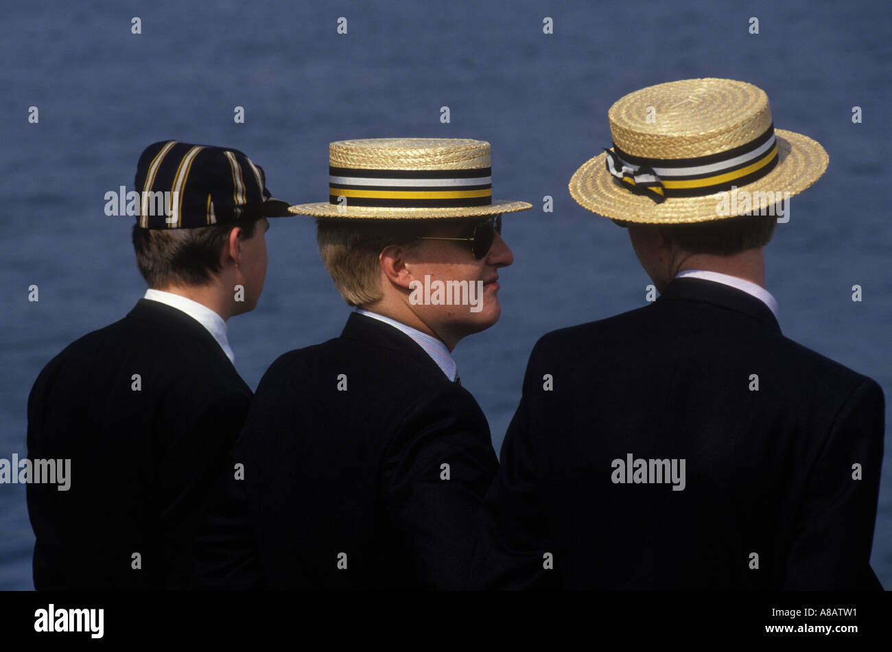 Straw boaters men wearing traditional rowing club hats at annual Henley ...
