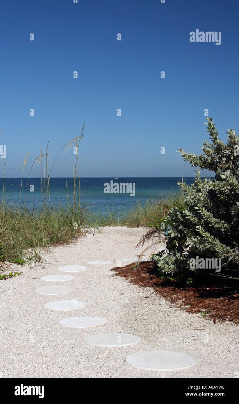path, stone boardwalk leading out to the sea ocean water Stock Photo ...