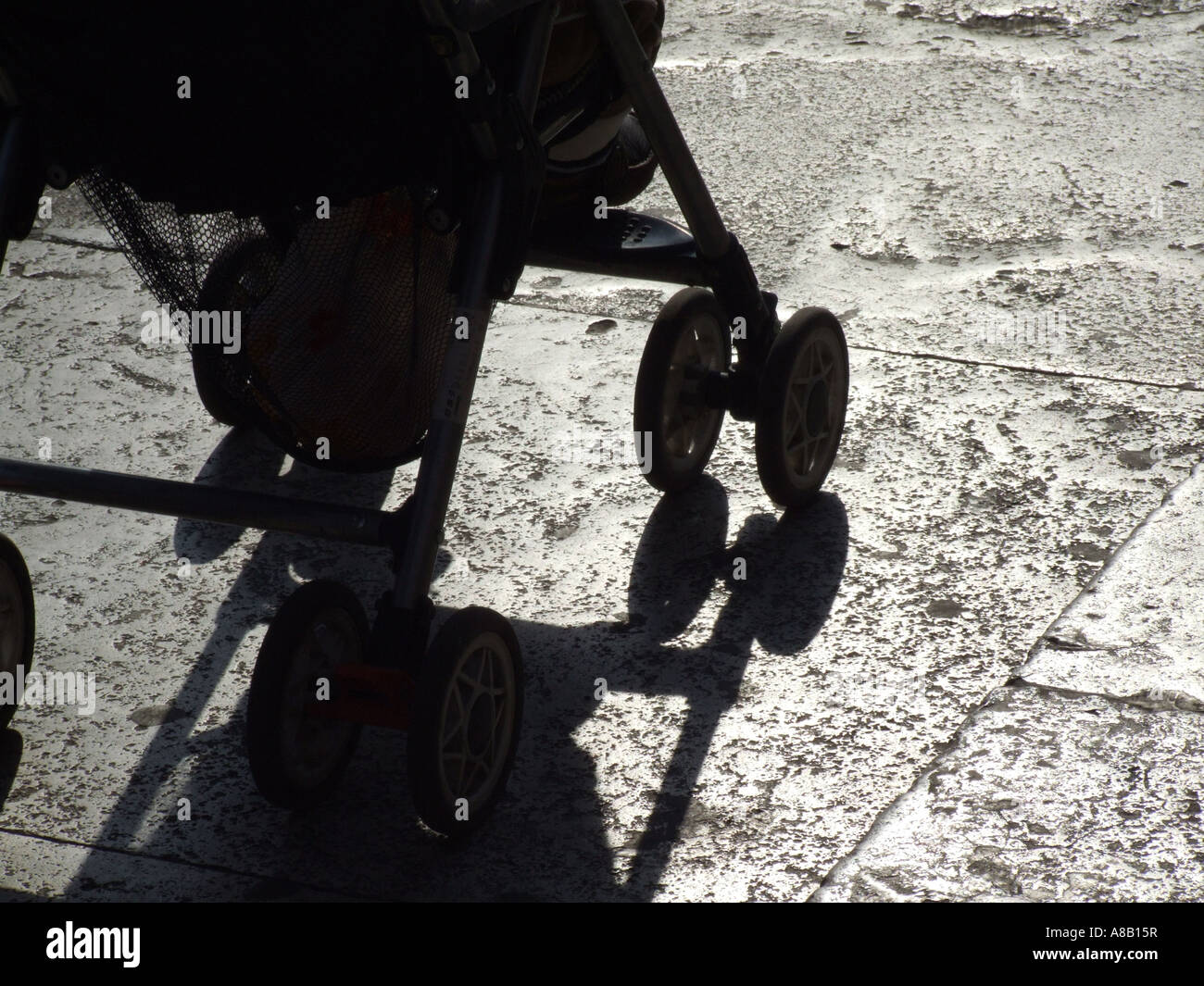 person pushing pram Stock Photo - Alamy