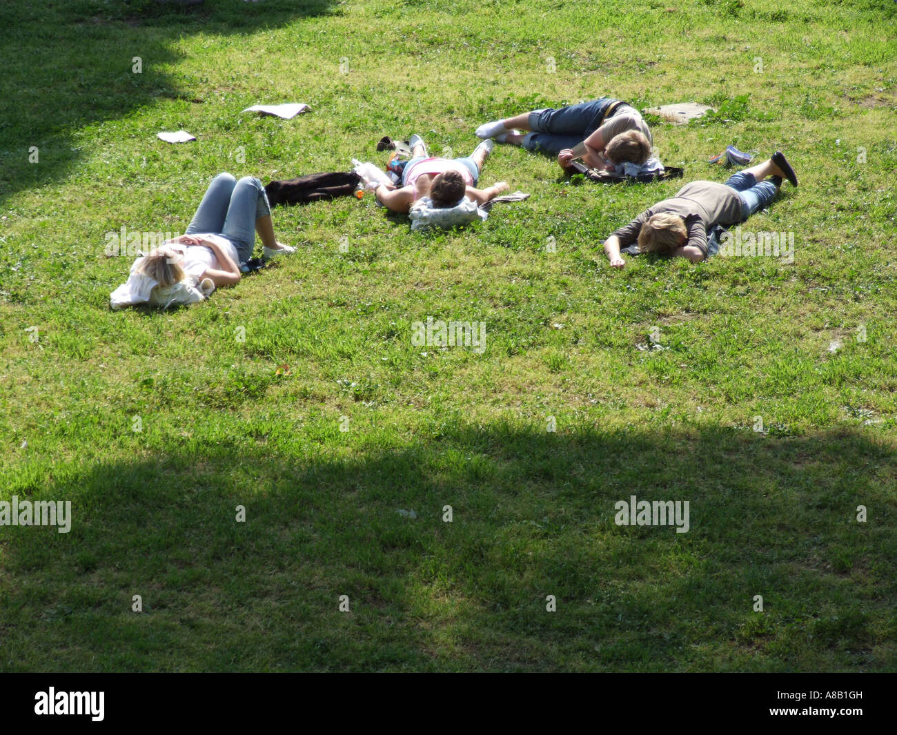 people sleeping in park in rome Stock Photo - Alamy