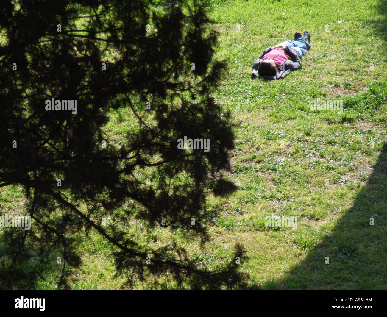 people sleeping in park in rome Stock Photo - Alamy