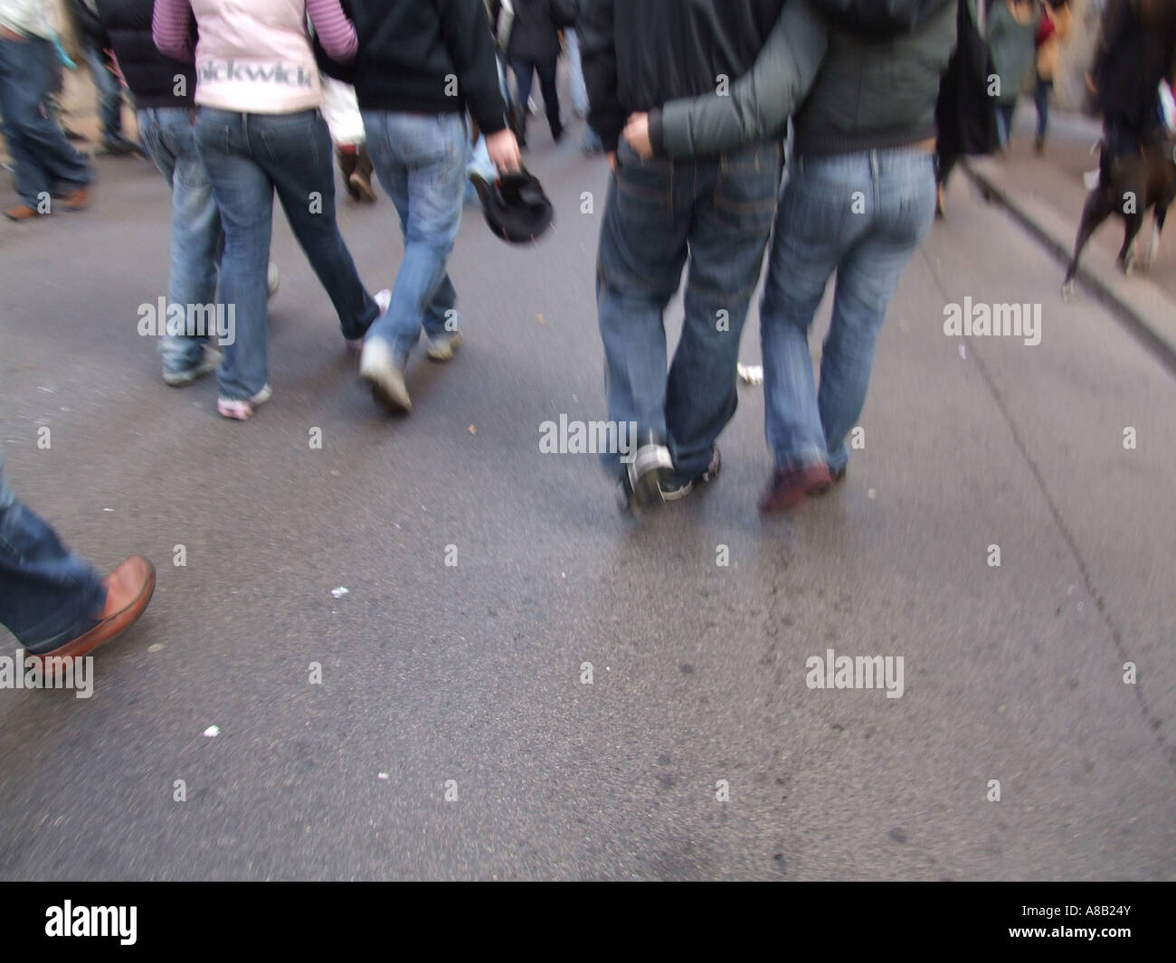 young people walking in town Stock Photo - Alamy