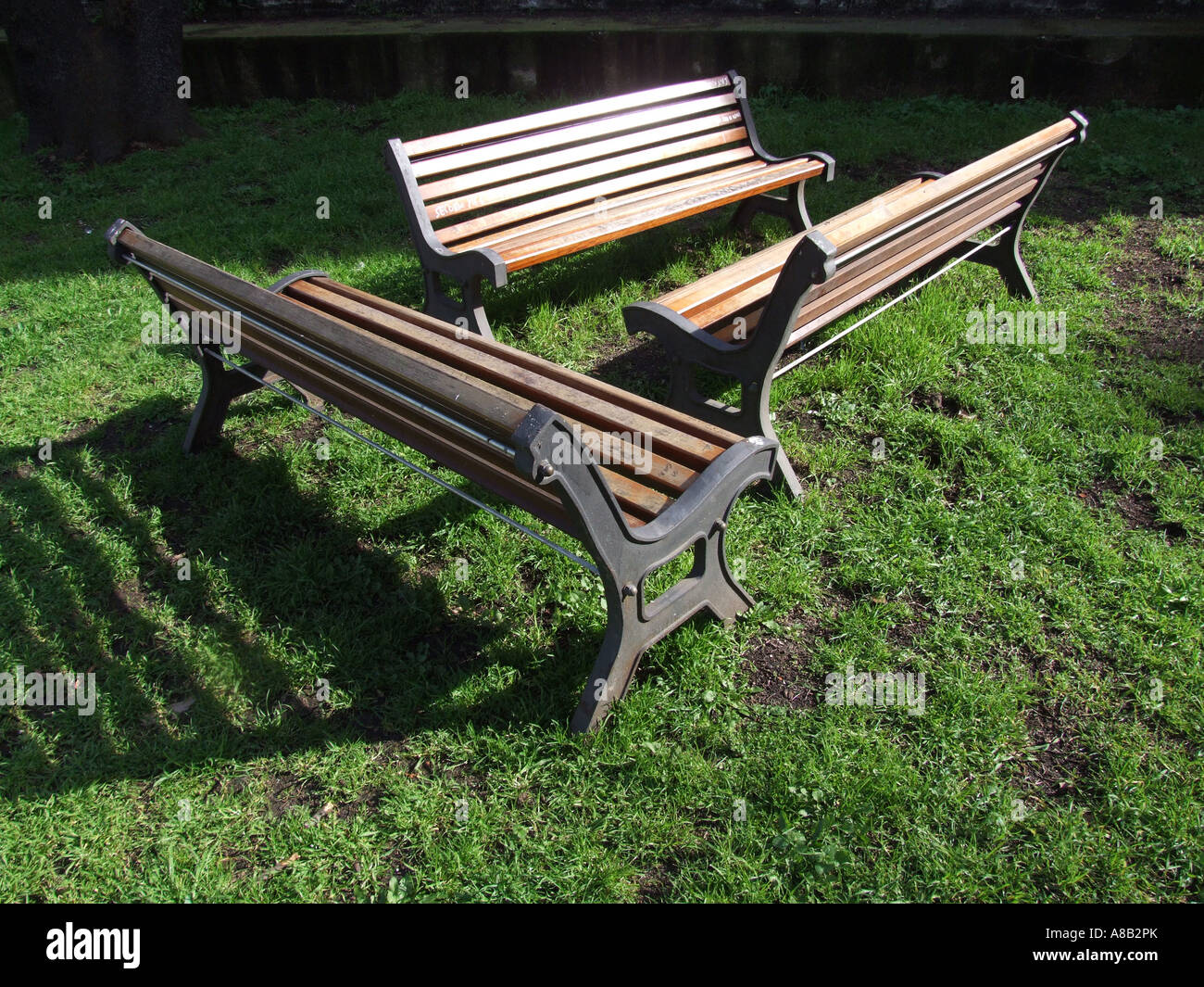 three benches in park Stock Photo - Alamy