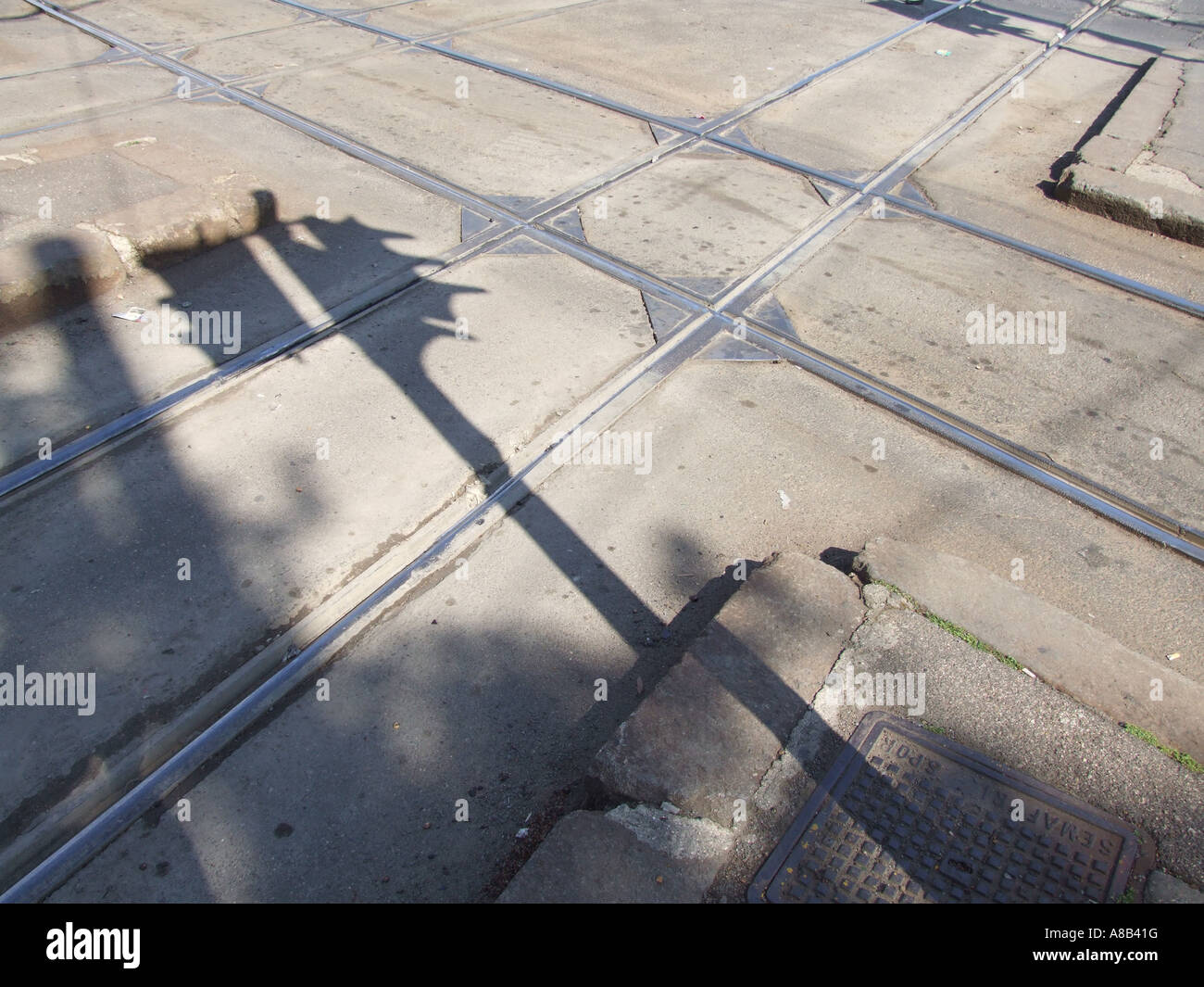 traffic lights shadow on tram lines in rome italy Stock Photo - Alamy