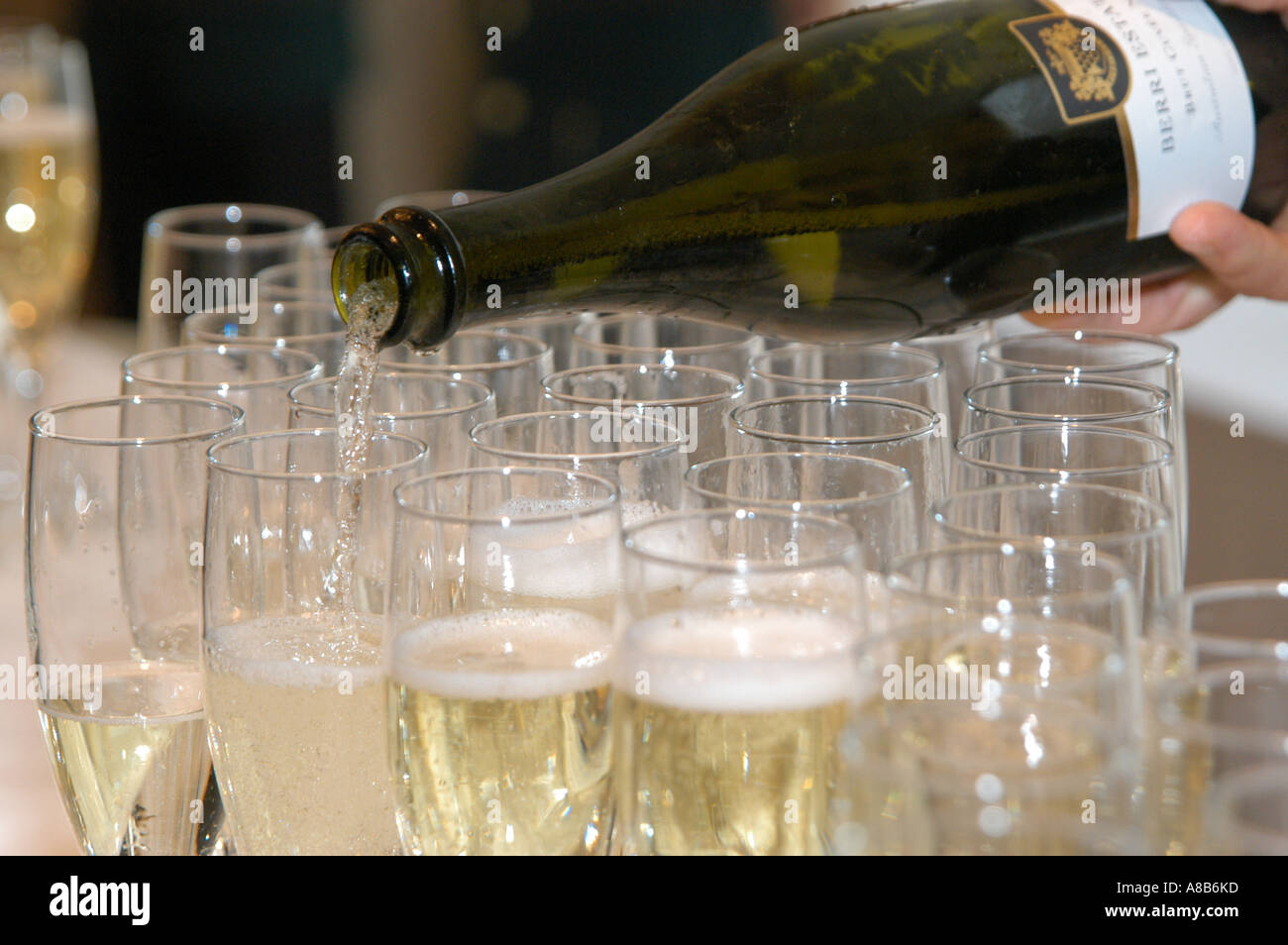 champagne being poured Stock Photo - Alamy