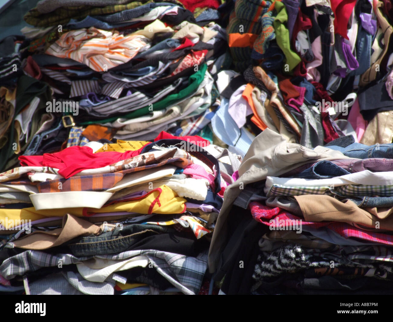pile of folded clothes Stock Photo - Alamy
