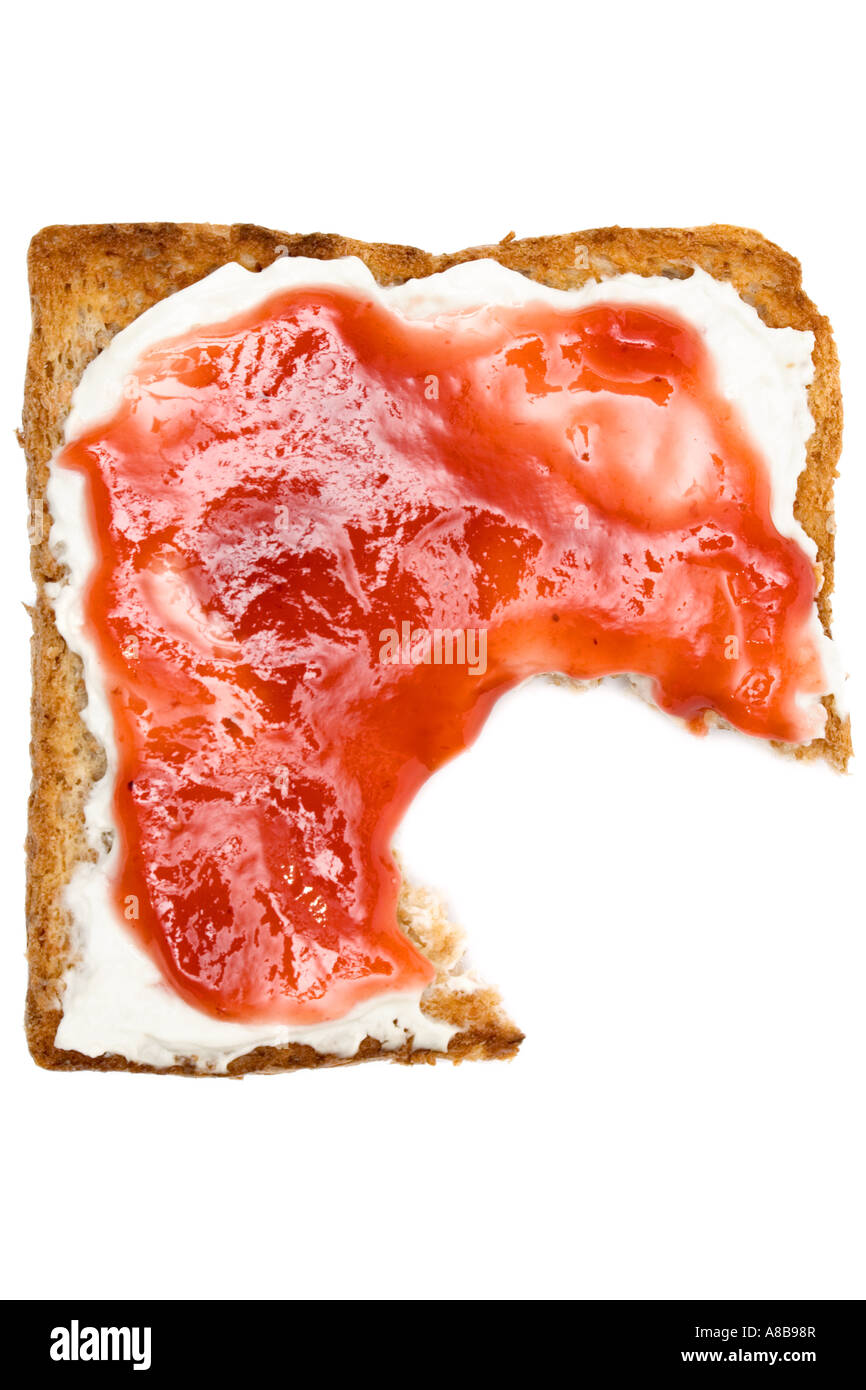 Eating a toast with raspberry jam Isolated on a white background Stock ...