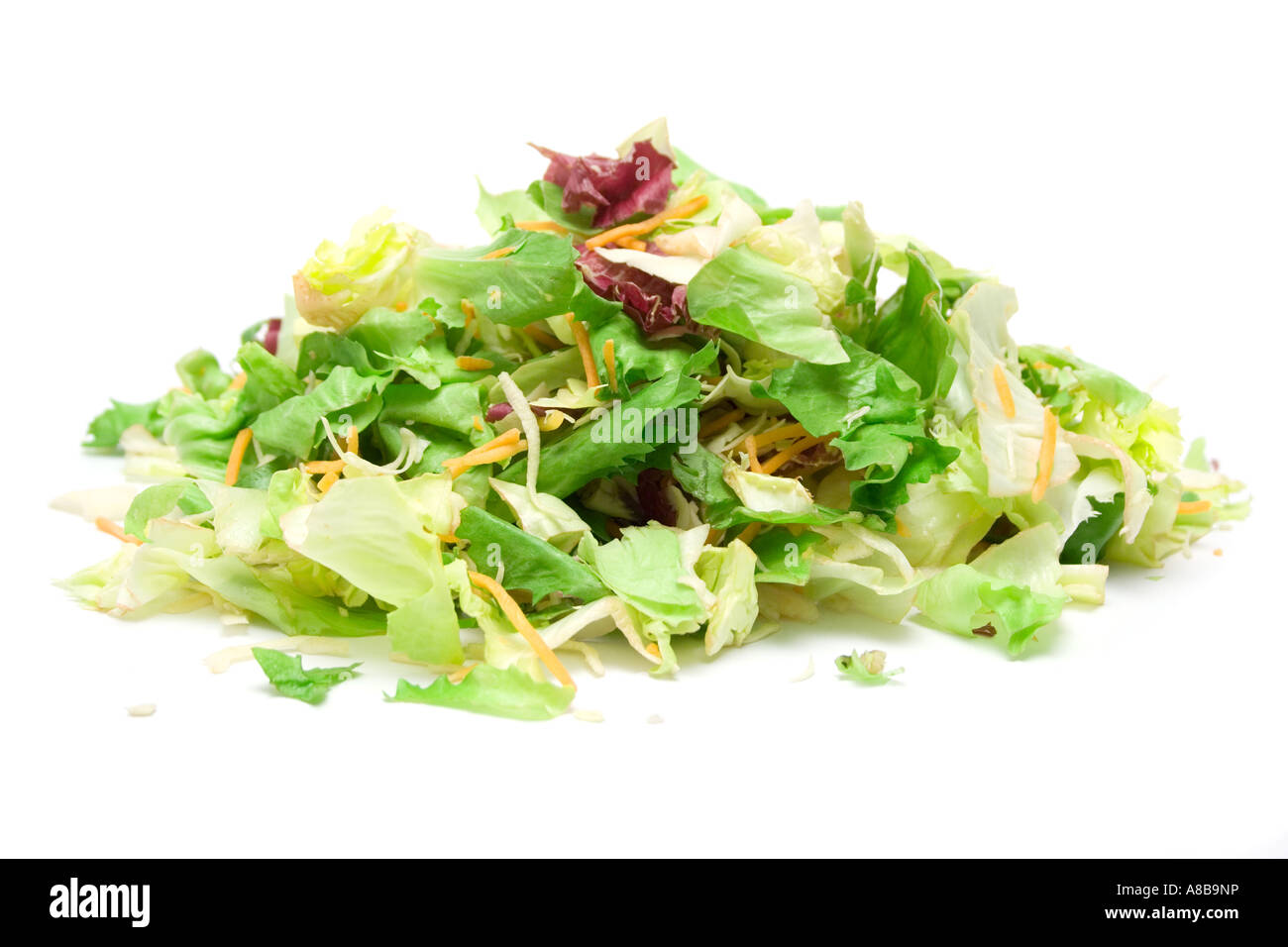 Pile of fresh salad isolated on a white background Stock Photo - Alamy