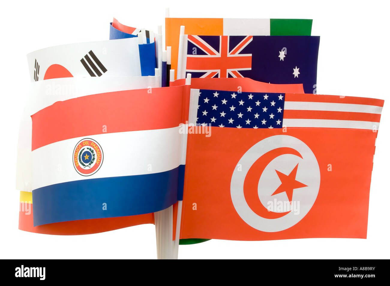 Small paper flags of various nations isolated on a white background ...