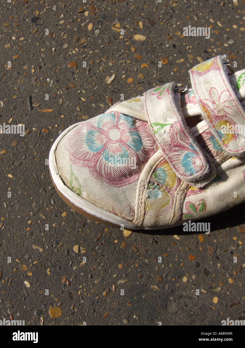 child's shoe left on street Stock Photo - Alamy