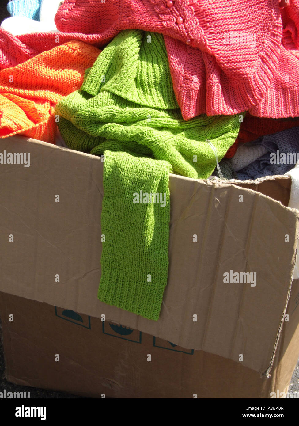 clothes in box Stock Photo - Alamy
