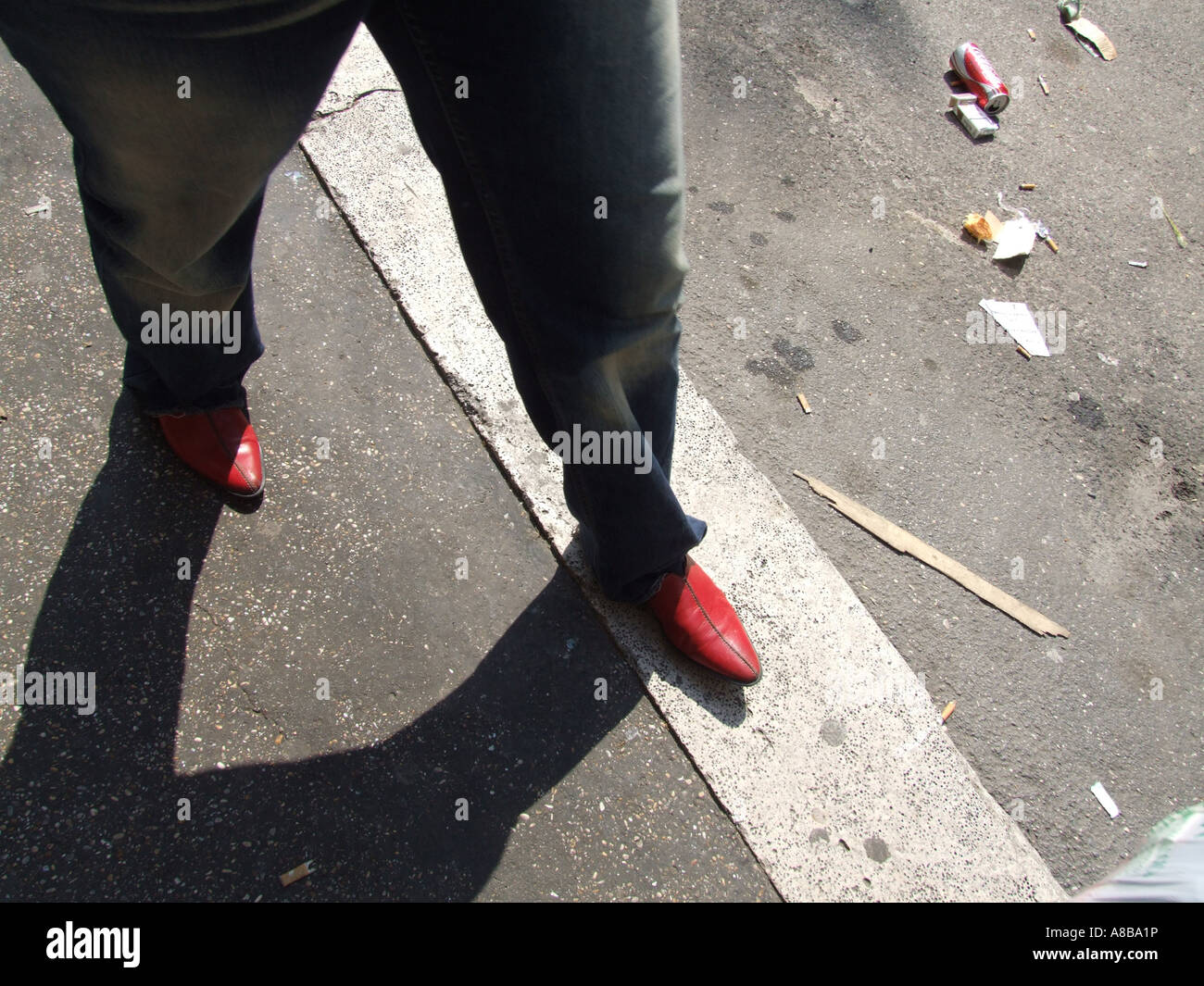 one person walking in street in city town Stock Photo - Alamy