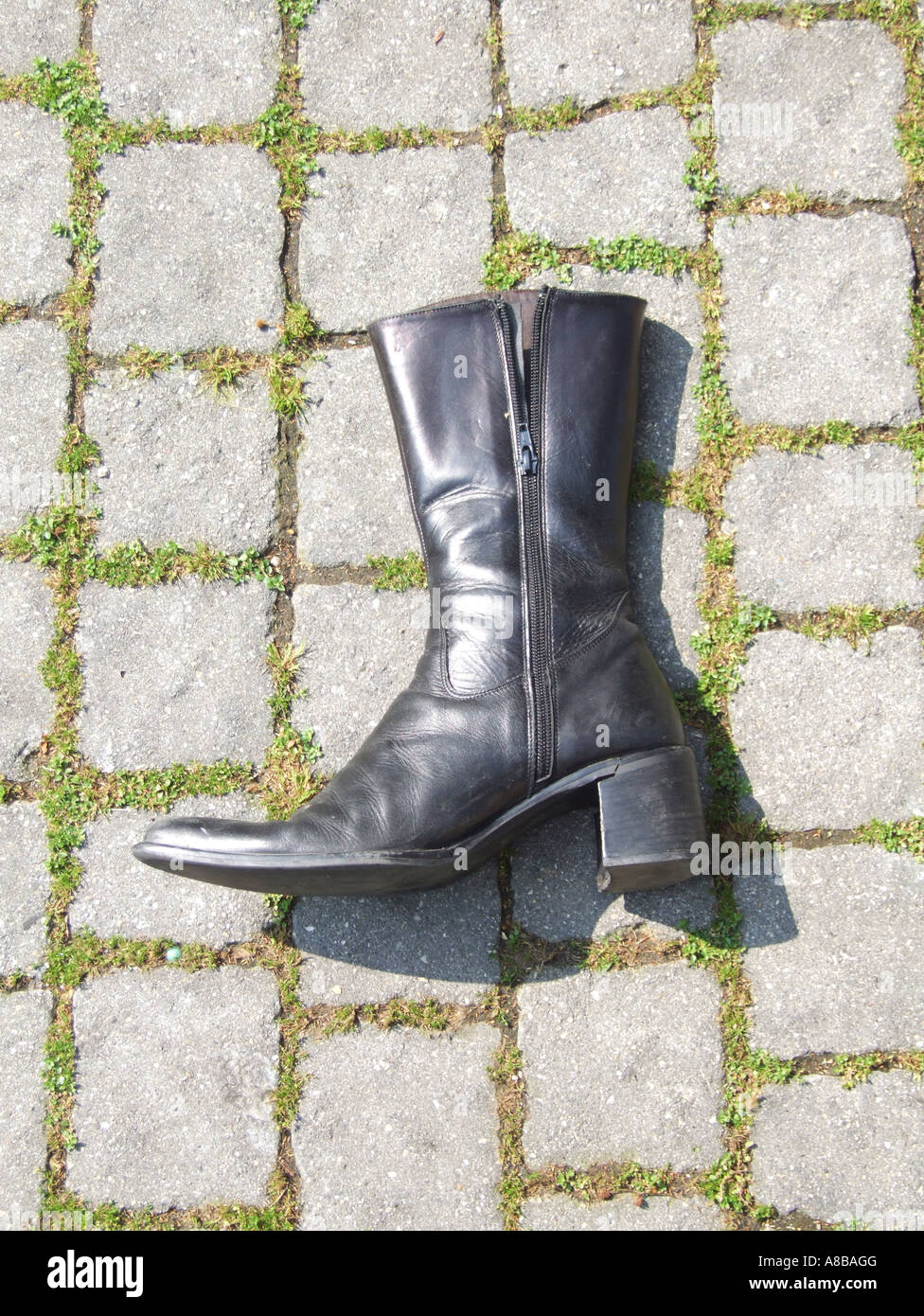 old shoes in street Stock Photo - Alamy