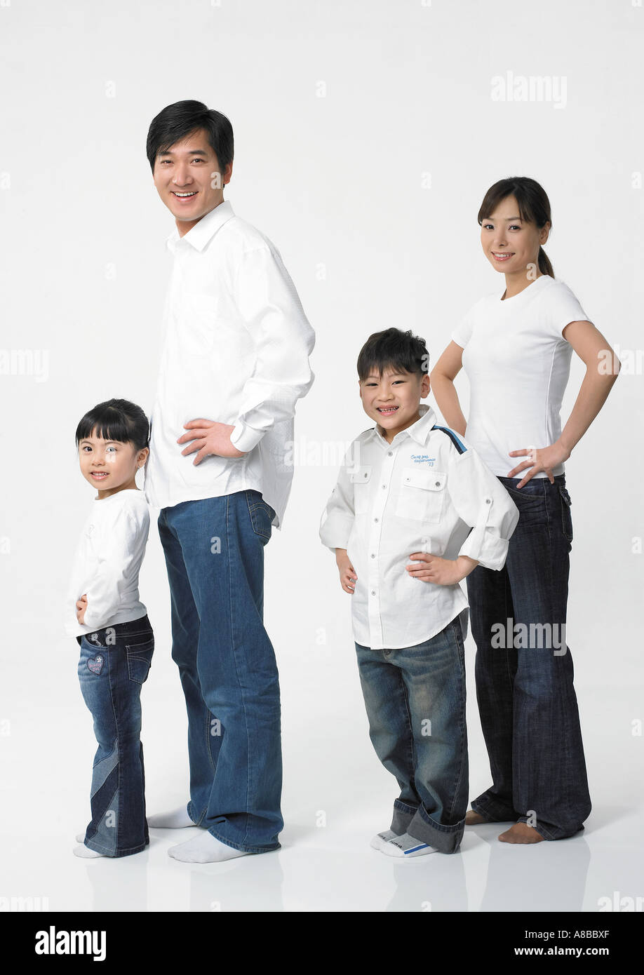 family members keep their hands at their sides Stock Photo - Alamy