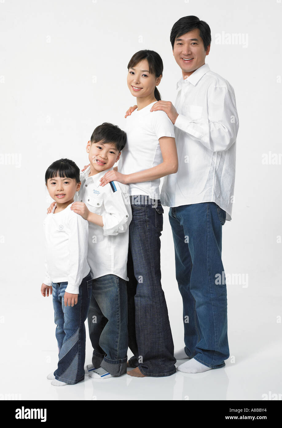 family members stood in order of height Stock Photo - Alamy