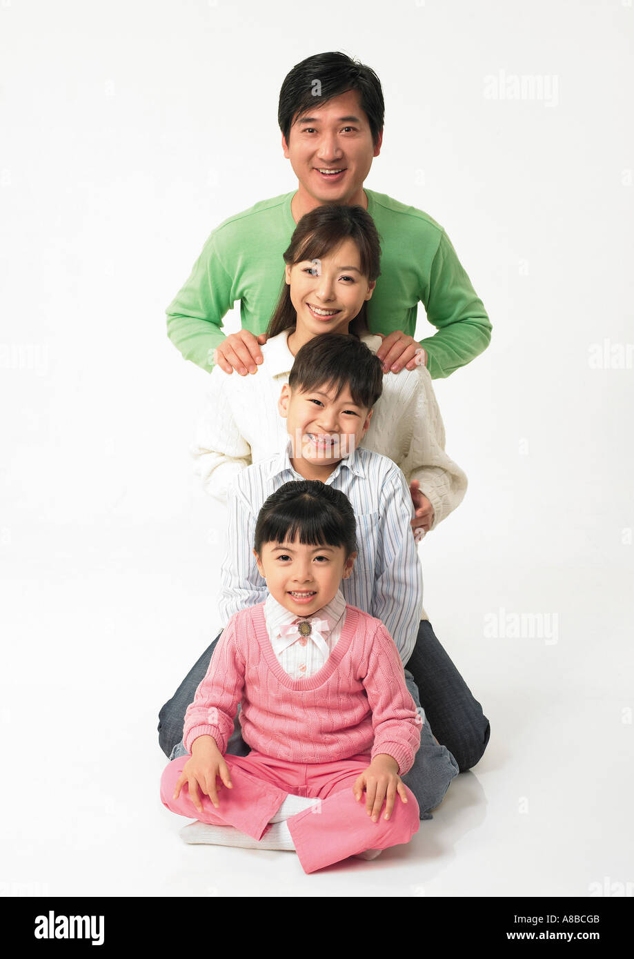 family members are in a row Stock Photo - Alamy
