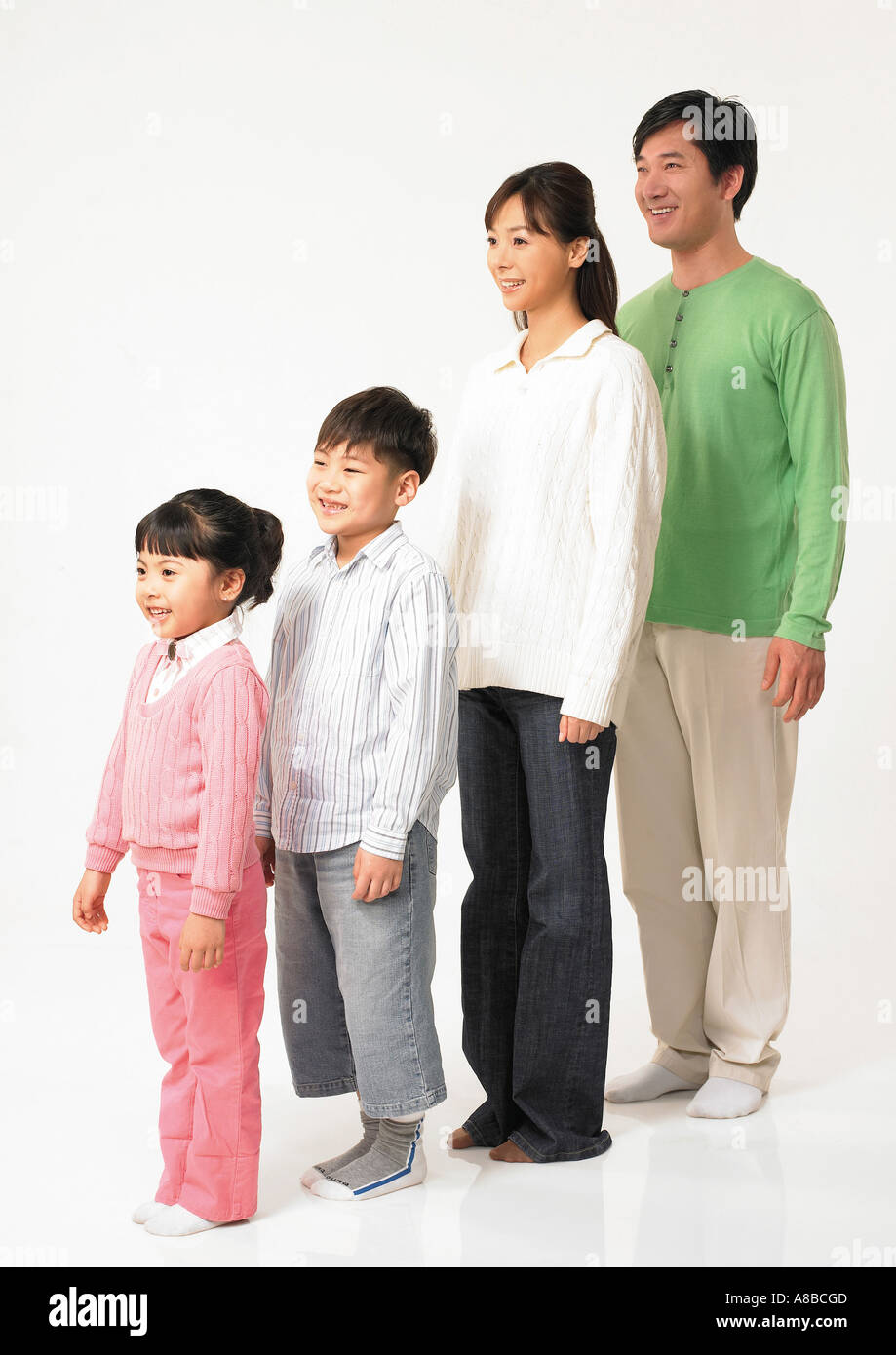 family members stood in order of height Stock Photo - Alamy