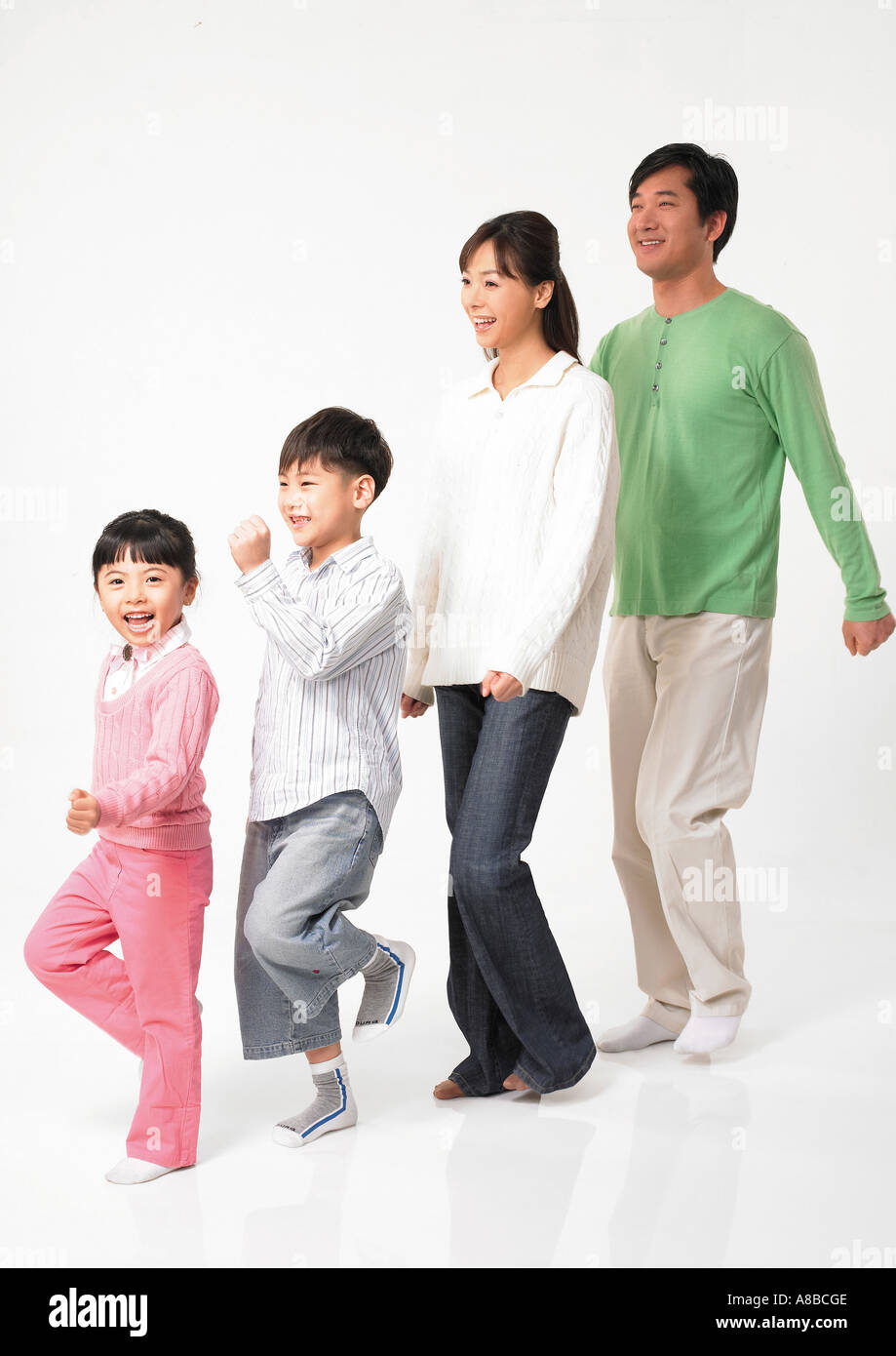 family members stood in order of height Stock Photo - Alamy