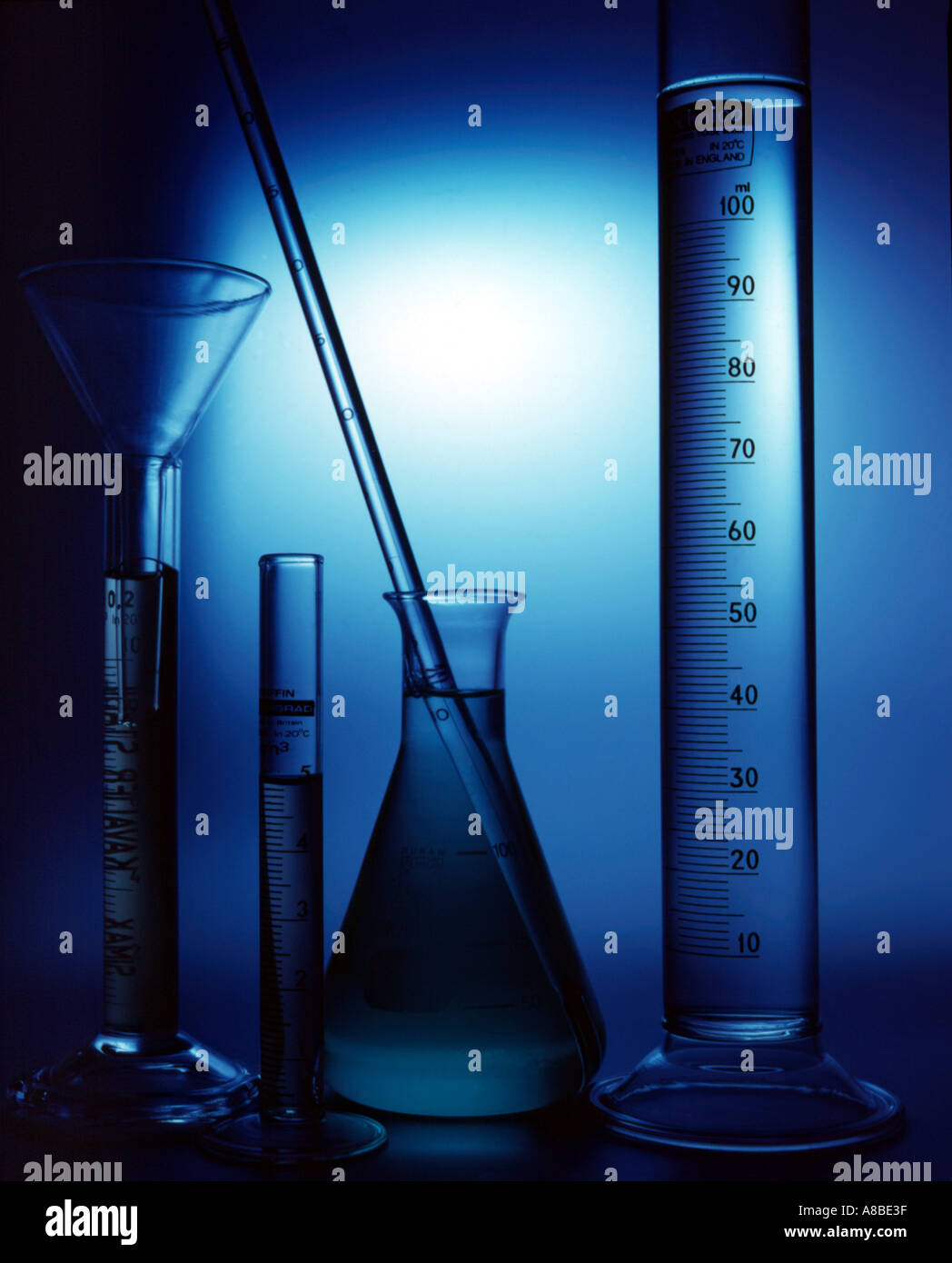 Glass chemical containers and thermometer Stock Photo - Alamy