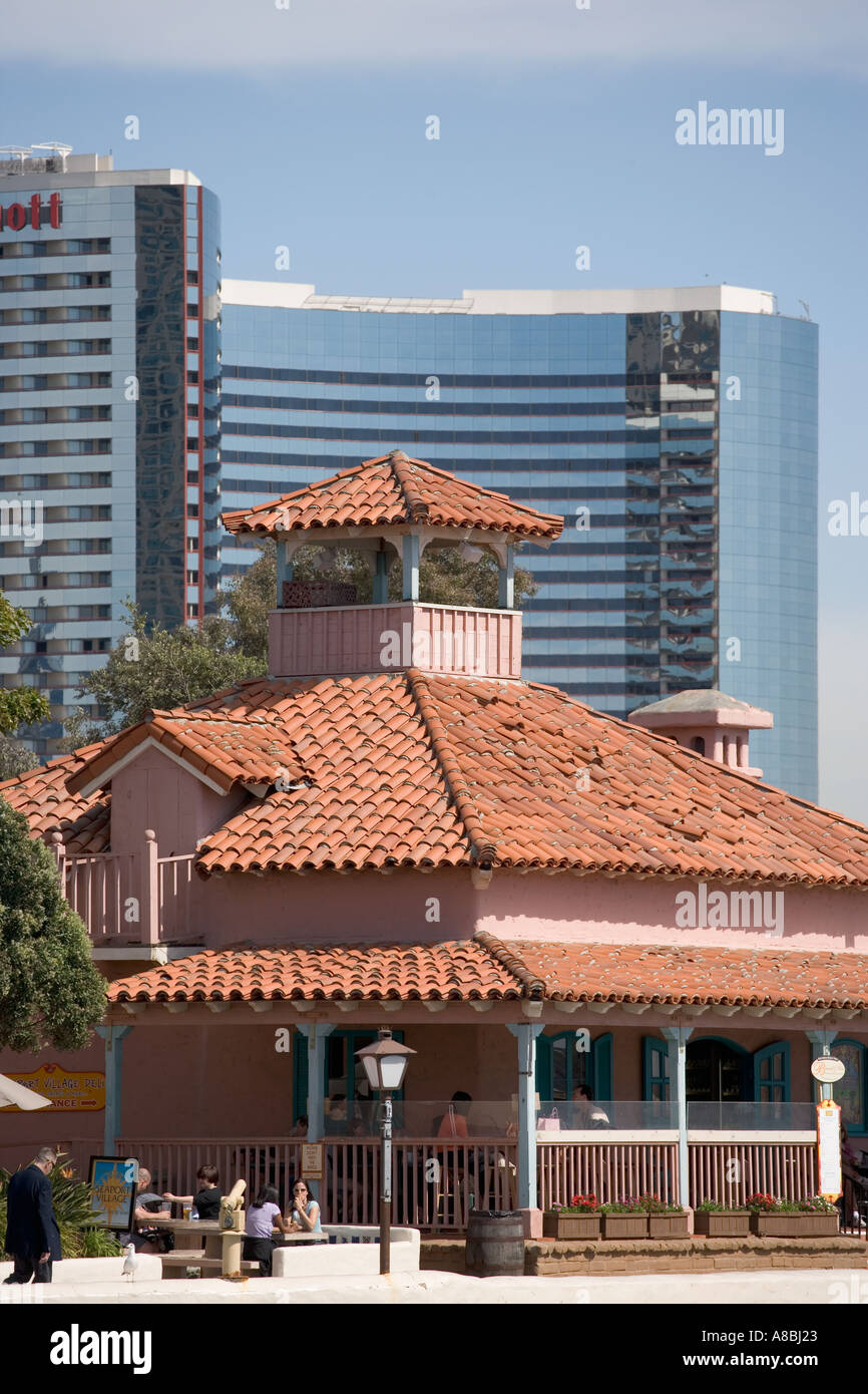 Contrast of older Spanish colonial style architecture with modern high ...