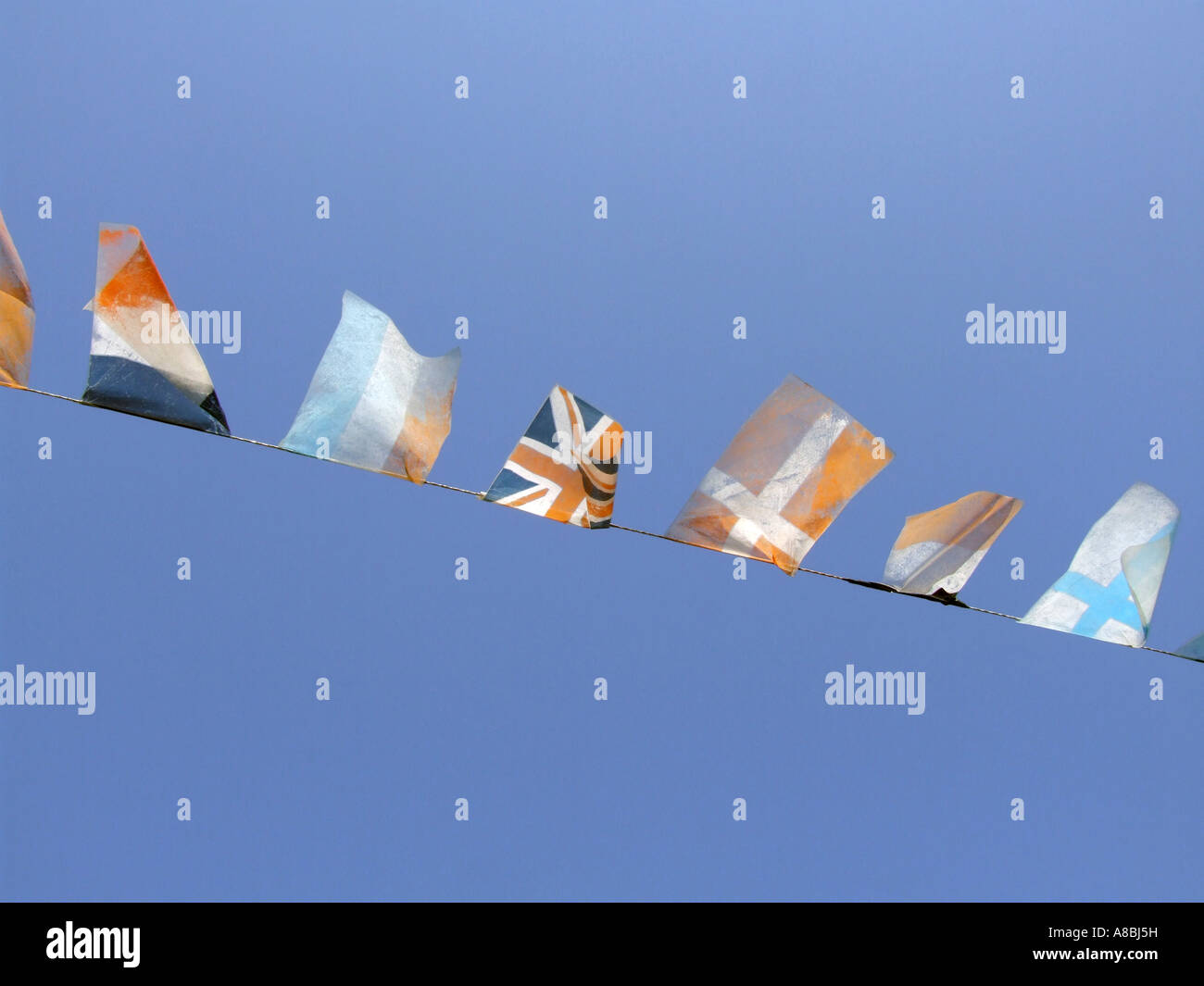 faded plastic flags Stock Photo - Alamy