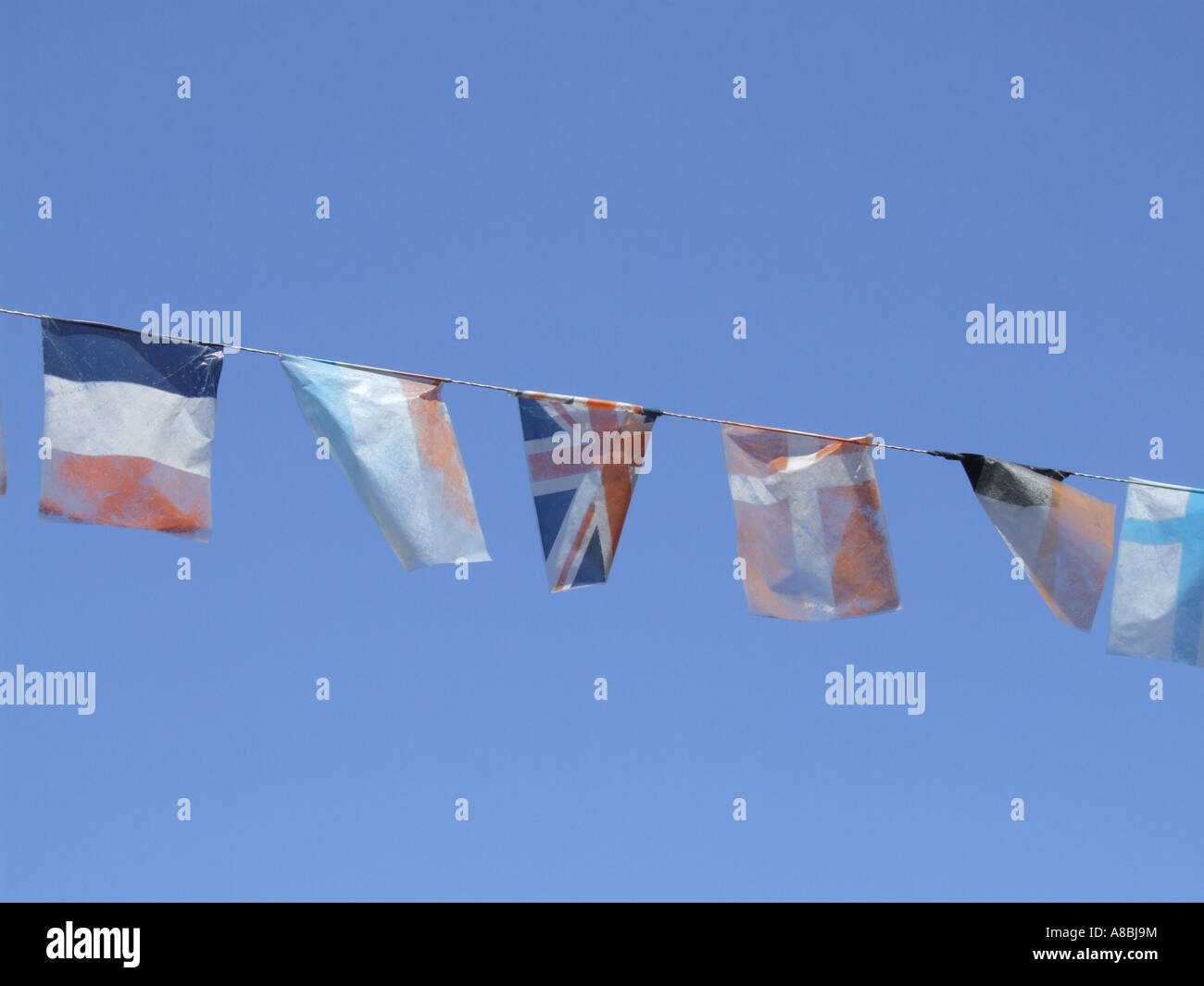 faded plastic flags Stock Photo - Alamy