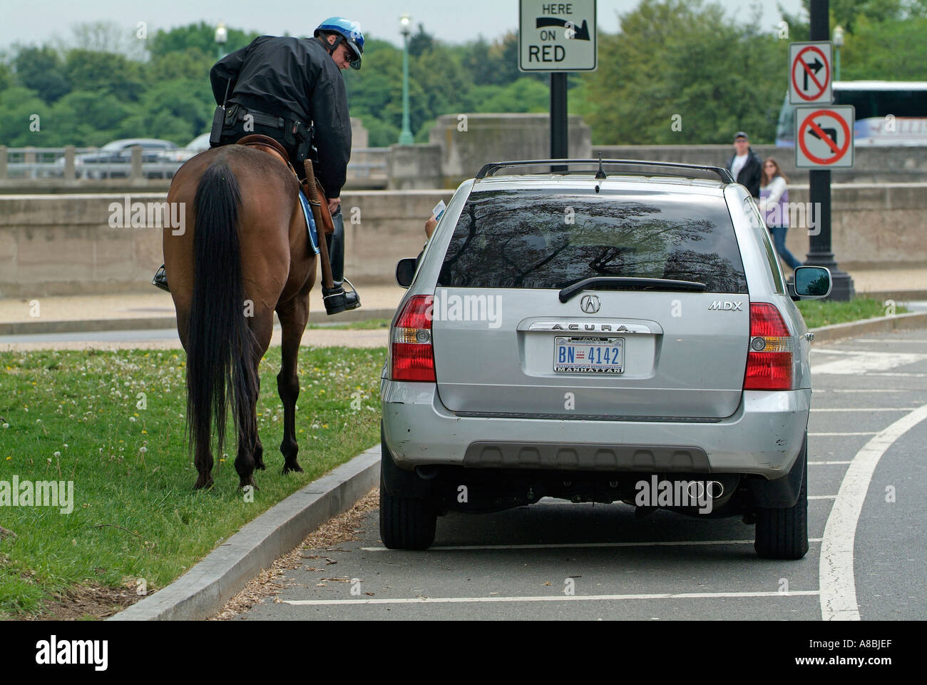 US Park Police Officer issue ticket for traffic violation Stock Photo ...