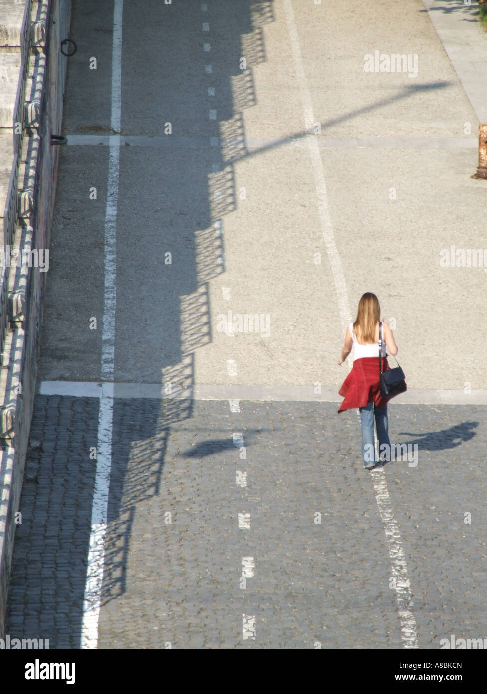girl walking along path Stock Photo - Alamy