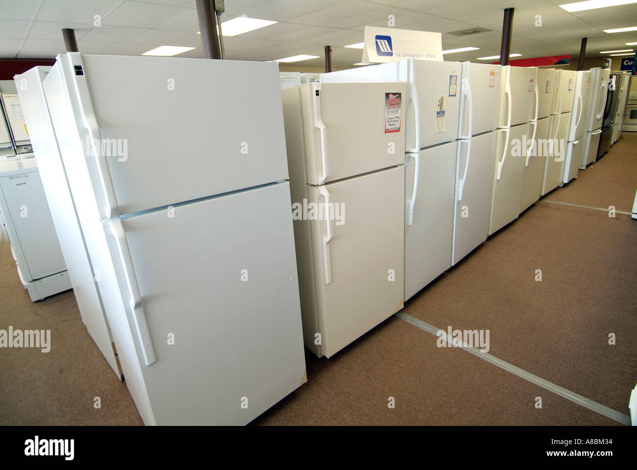 Display of new refrigerator appliances in store for sale Stock Photo ...