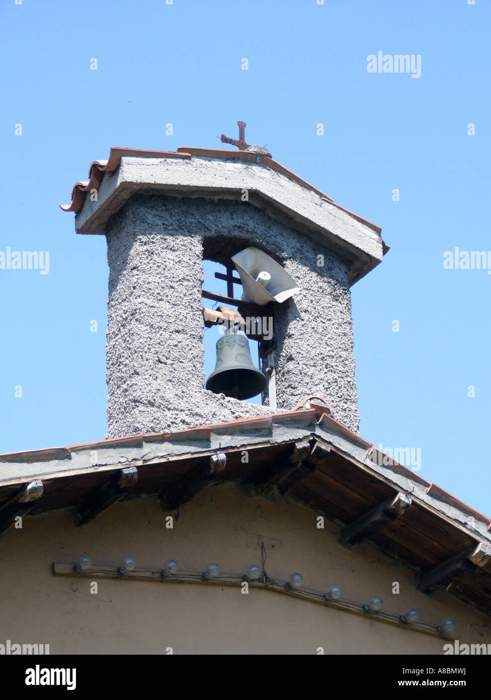 megaphone by church bell Stock Photo - Alamy