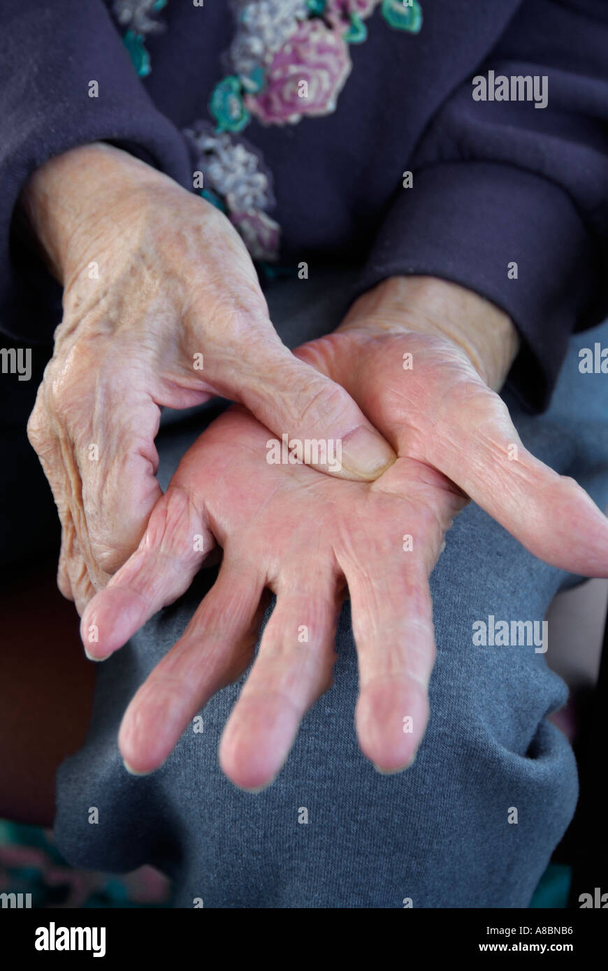 Massaging mature hi-res stock photography and images - Alamy