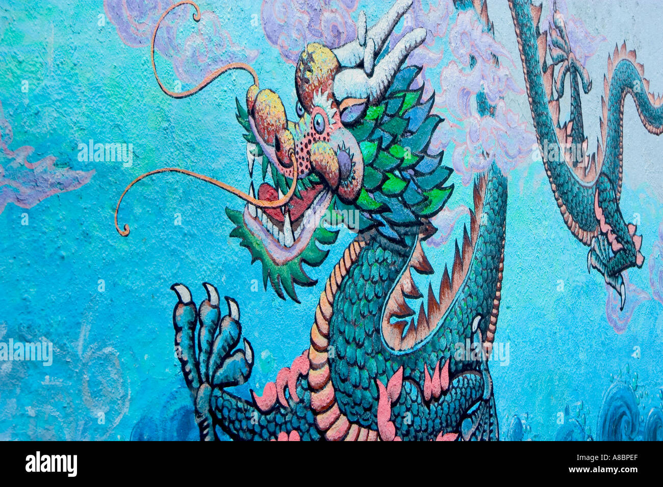 Painted mural of Chinese dragon on building wall in Chinatown in San ...