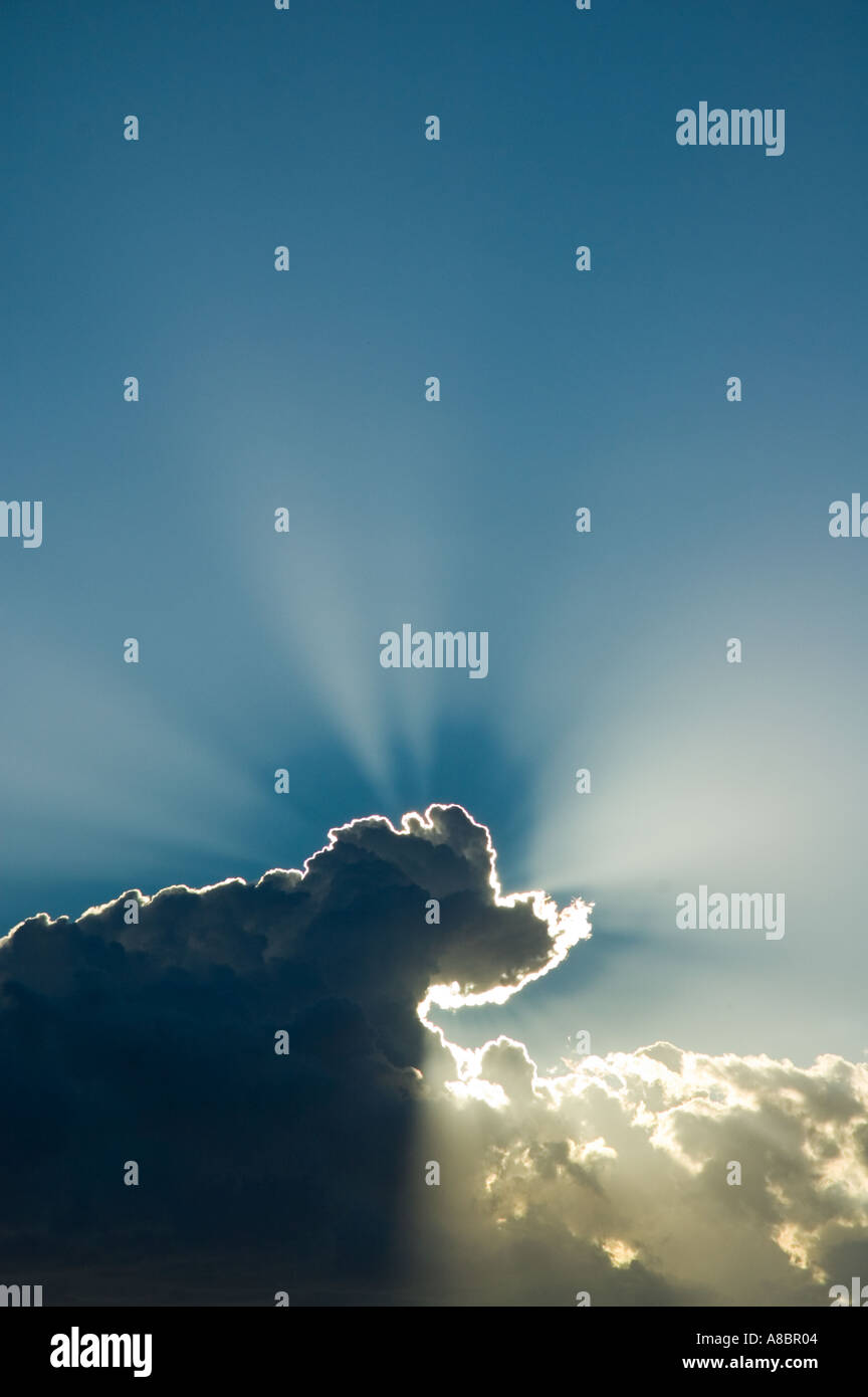 Sun Rays emerging from behind Clouds God Beams Africa Stock Photo - Alamy