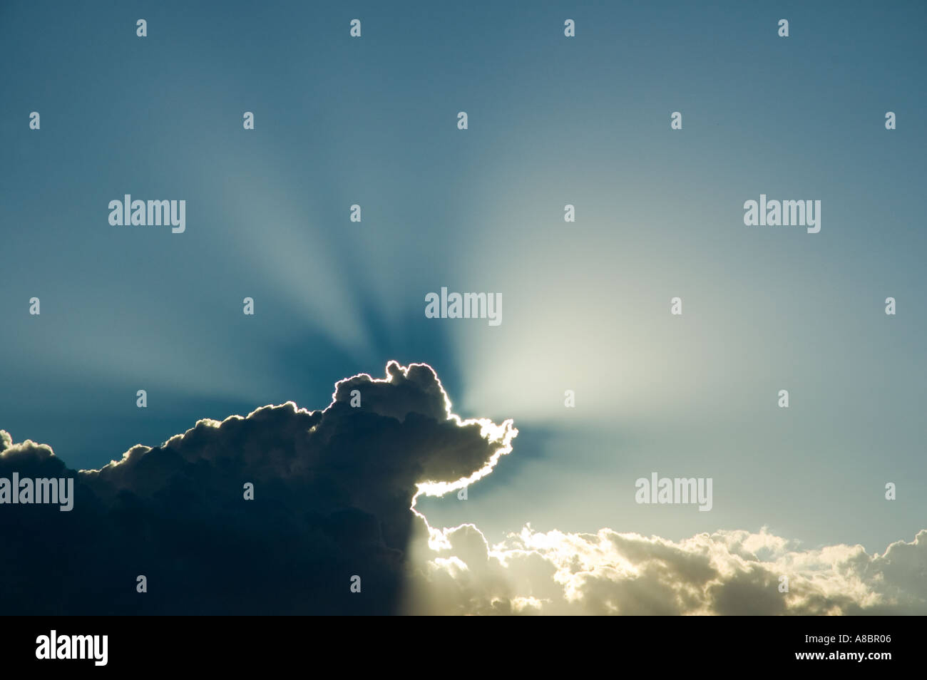 Sun Rays emerging from behind Clouds God Beams Africa Stock Photo - Alamy