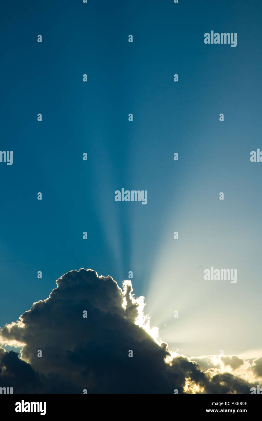 Sun Rays emerging from behind Clouds God Beams Africa Stock Photo - Alamy